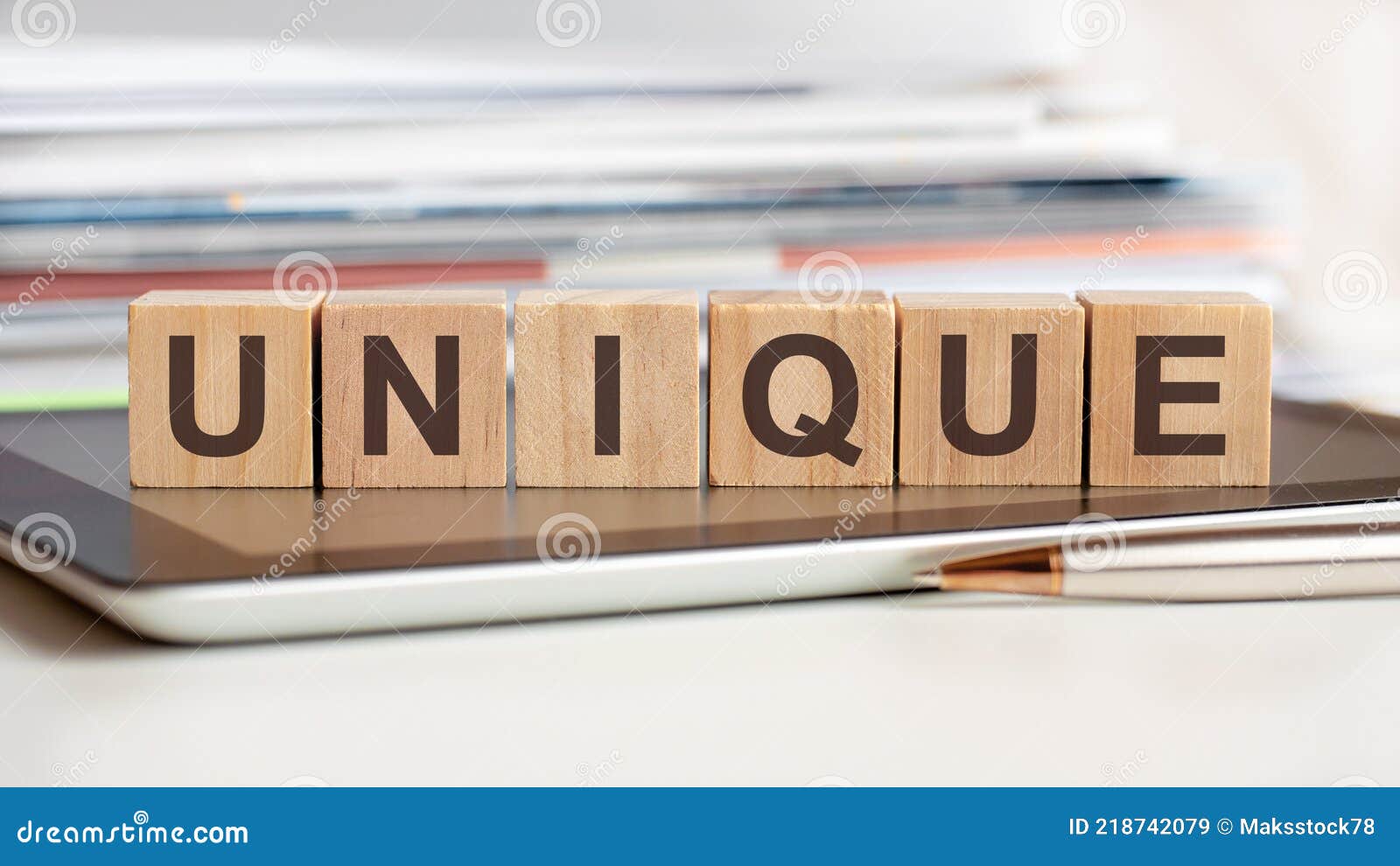 The Word Unique is Written on Wooden Cubes, Concept Stock Image - Image ...