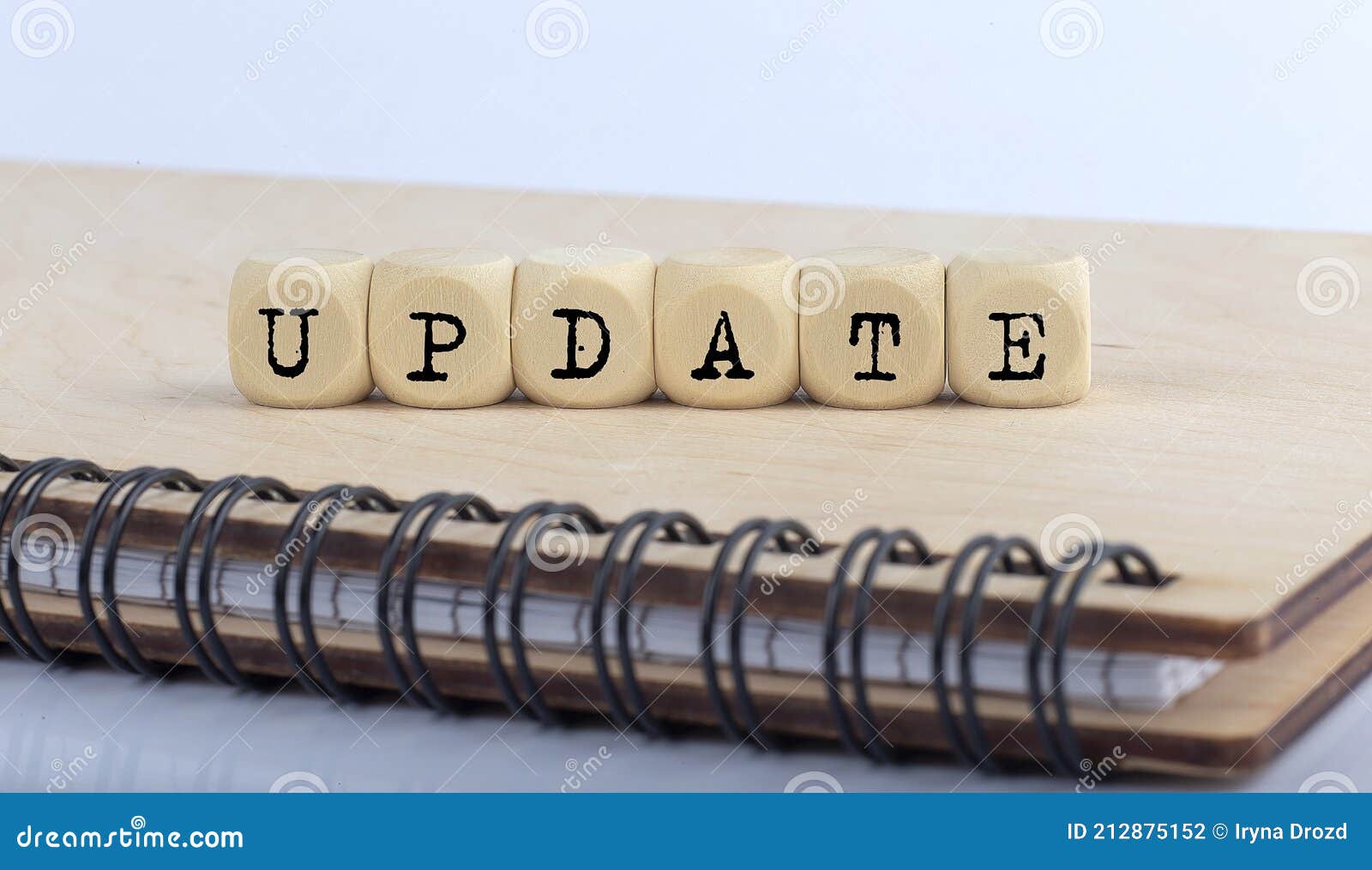 Word UPDATE Made with Letters on Wooden Blocks on Wooden Notepad Stock ...
