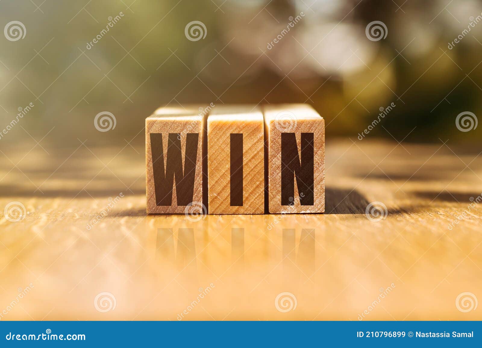 Word WIN Made with Building Wooden Blocks on Table in Sunlight Stock ...