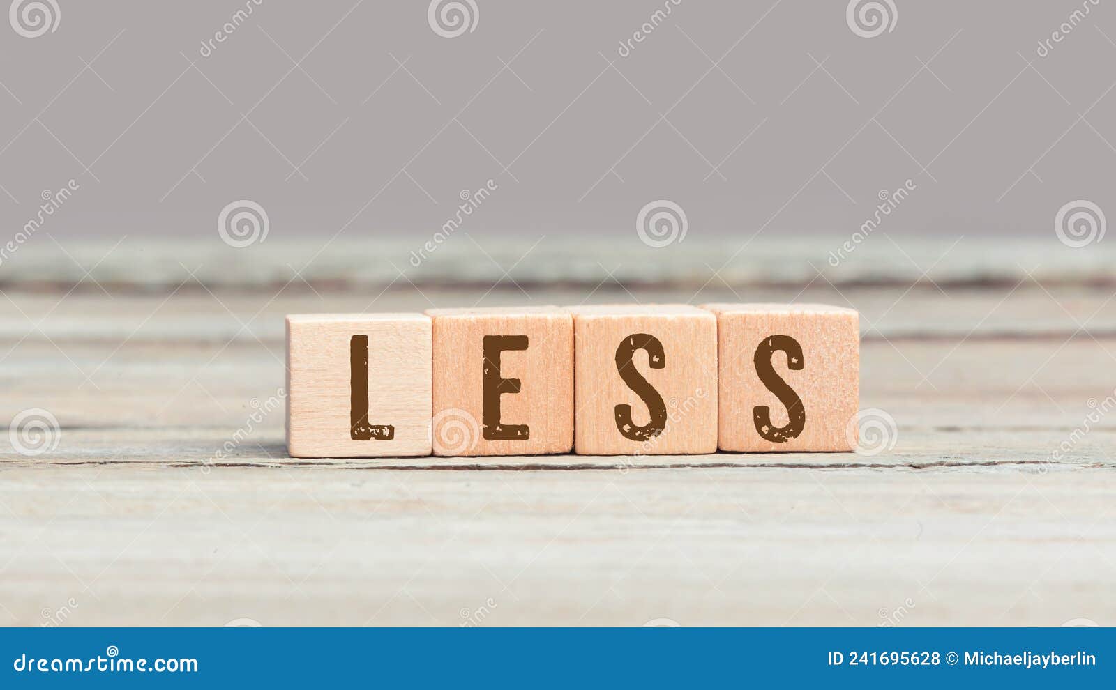 Word less on wood cubes stock photo. Image of text, wood - 241695628