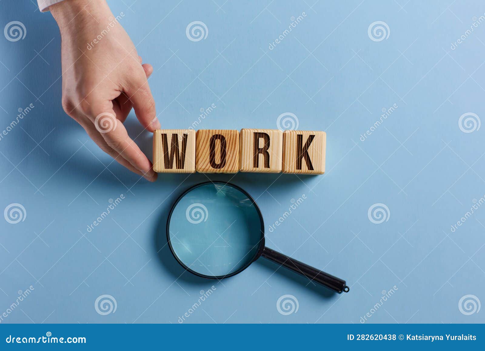The Word Work is Inscribed in Wooden Cubes. Blue Background. Stock ...