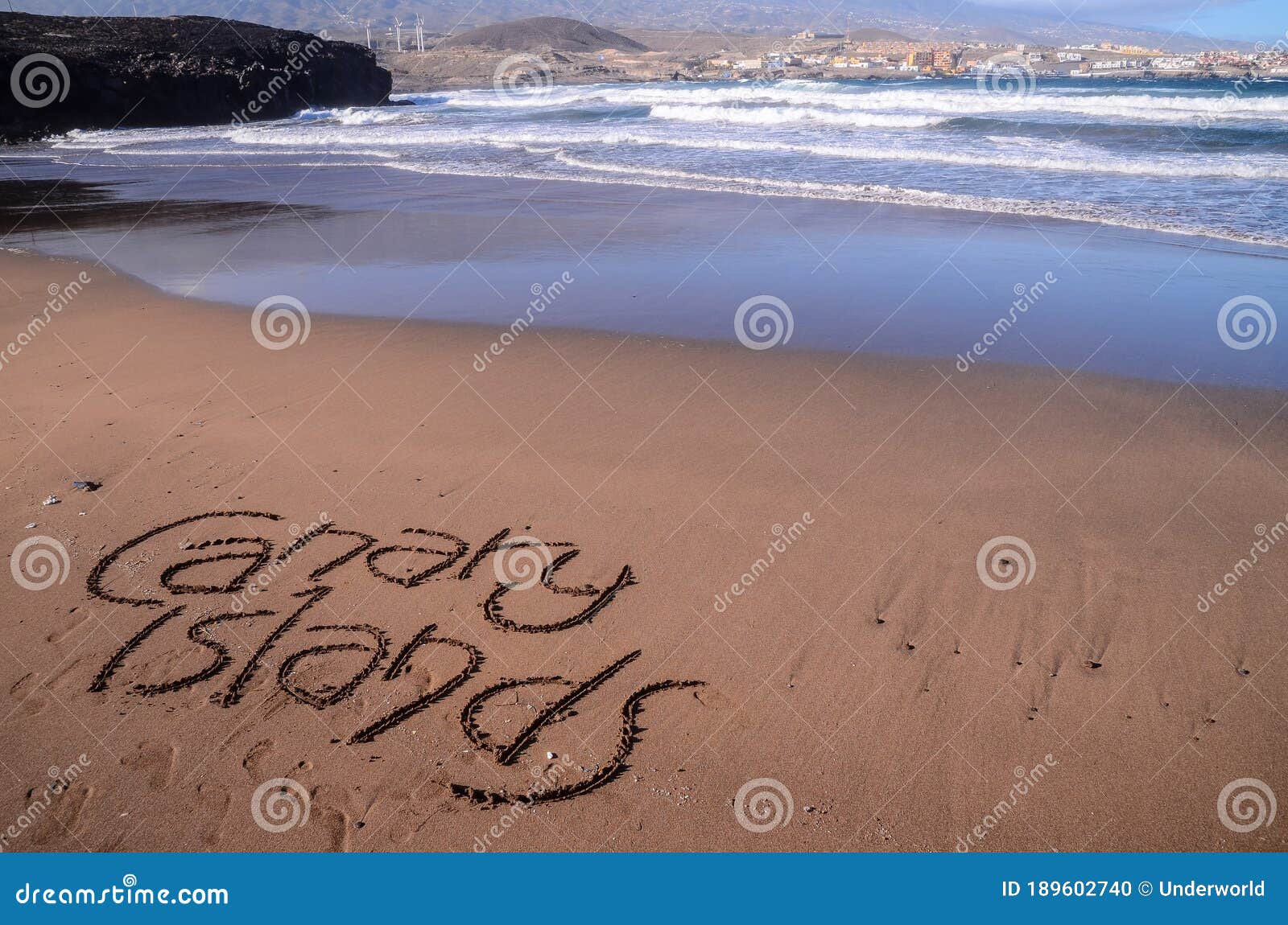 Word Written on the Sand stock photo. Image of symbol - 189602740