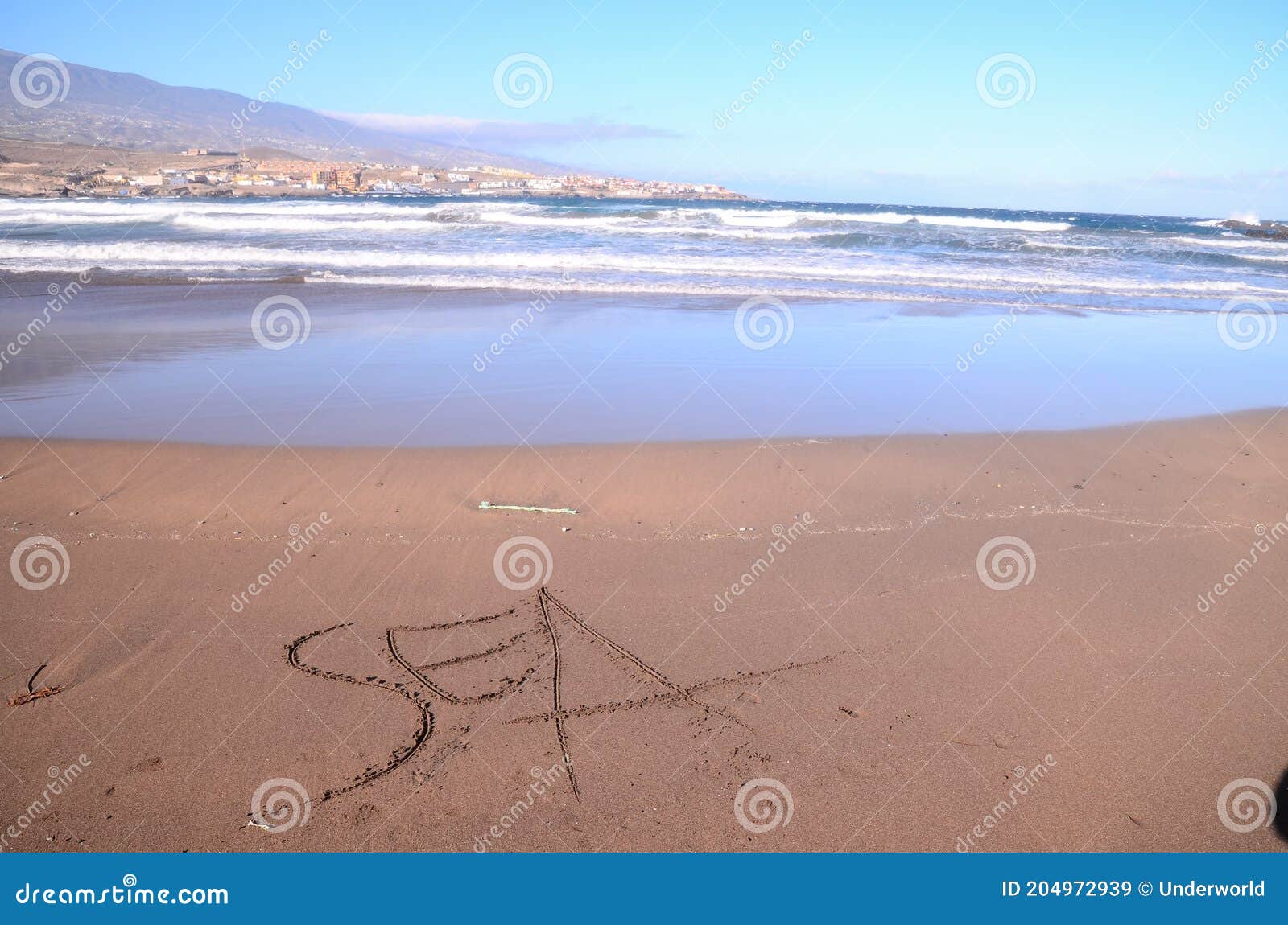 Word Written on the Sand stock image. Image of tropical - 204972939