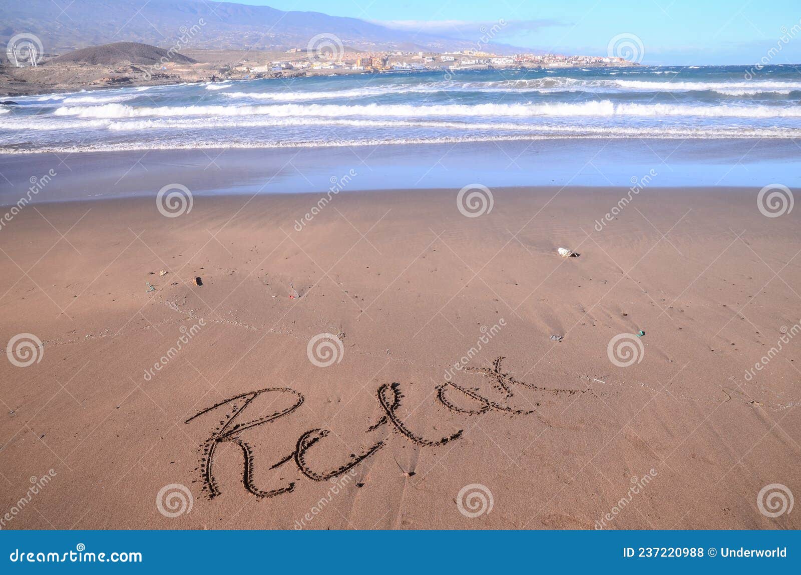 Word Written on the Sand stock photo. Image of coastline - 237220988
