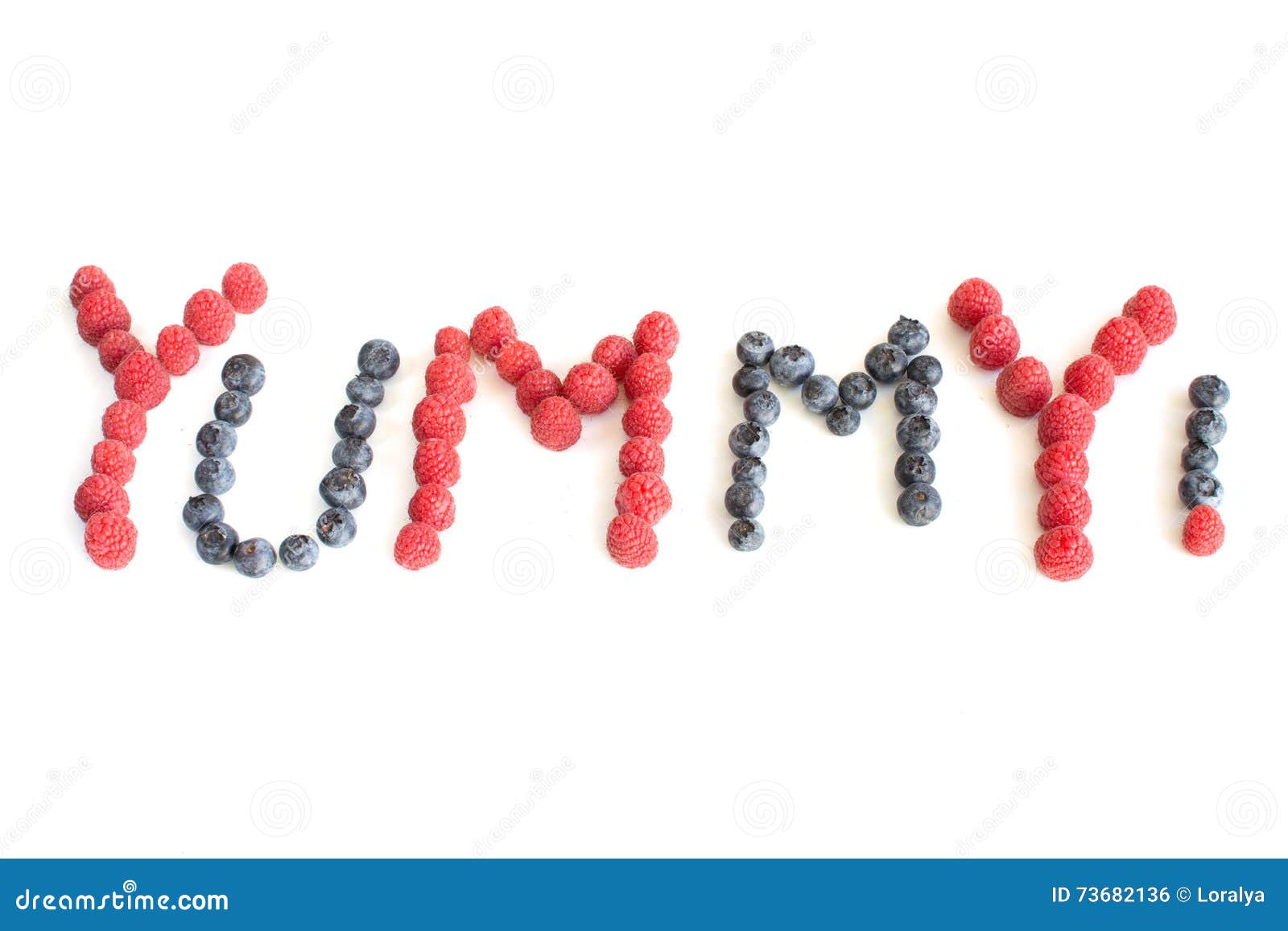 The Word Yummy! Written in Raspberries and Blueberries Stock Photo ...