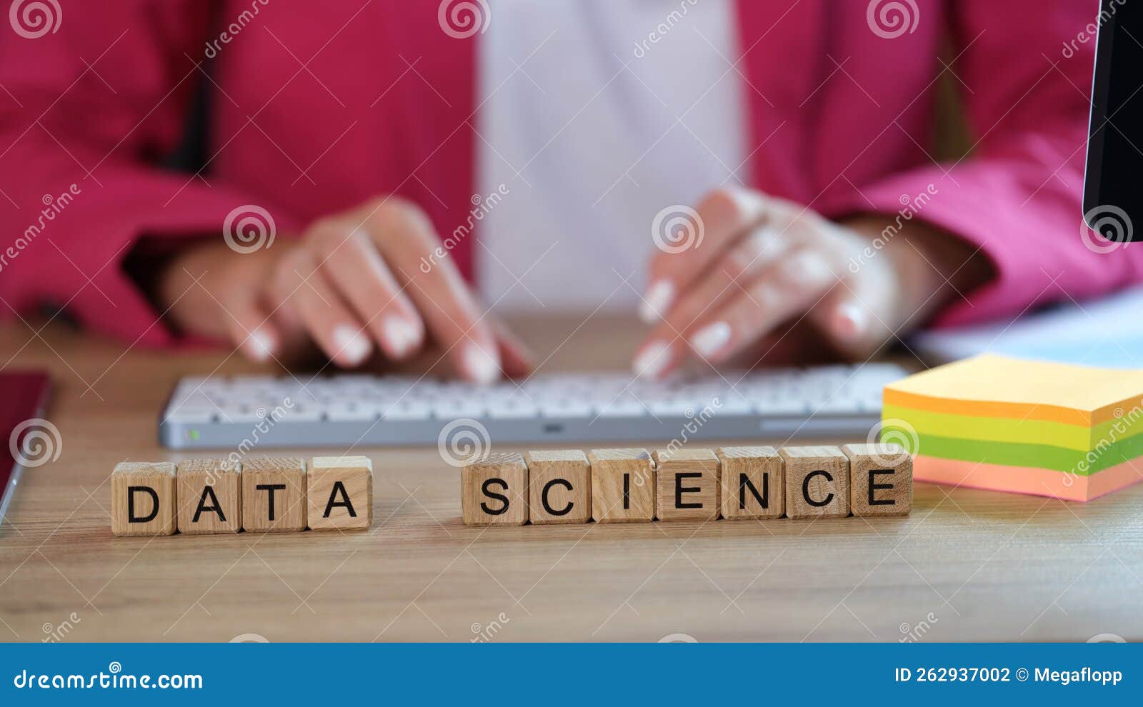 Words Data Science on Wooden Cubes and Female Scientist Working with ...