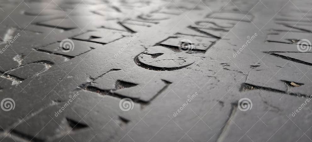 Words Etched in Stone with Dramatic Light. Stock Image - Image of ...
