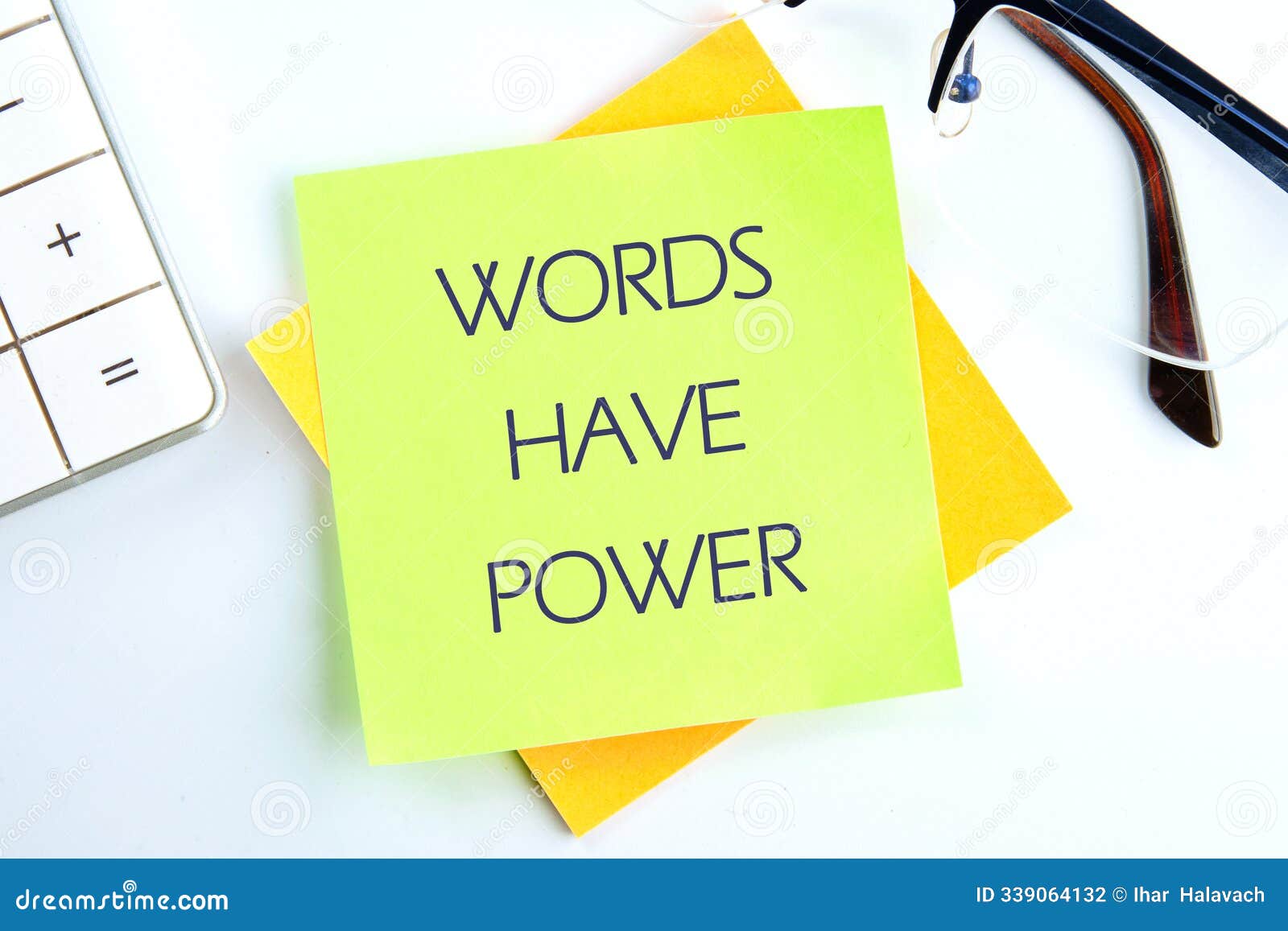 WORDS HAVE POWER TEXT Written on a Light Green Sticker on a Light ...