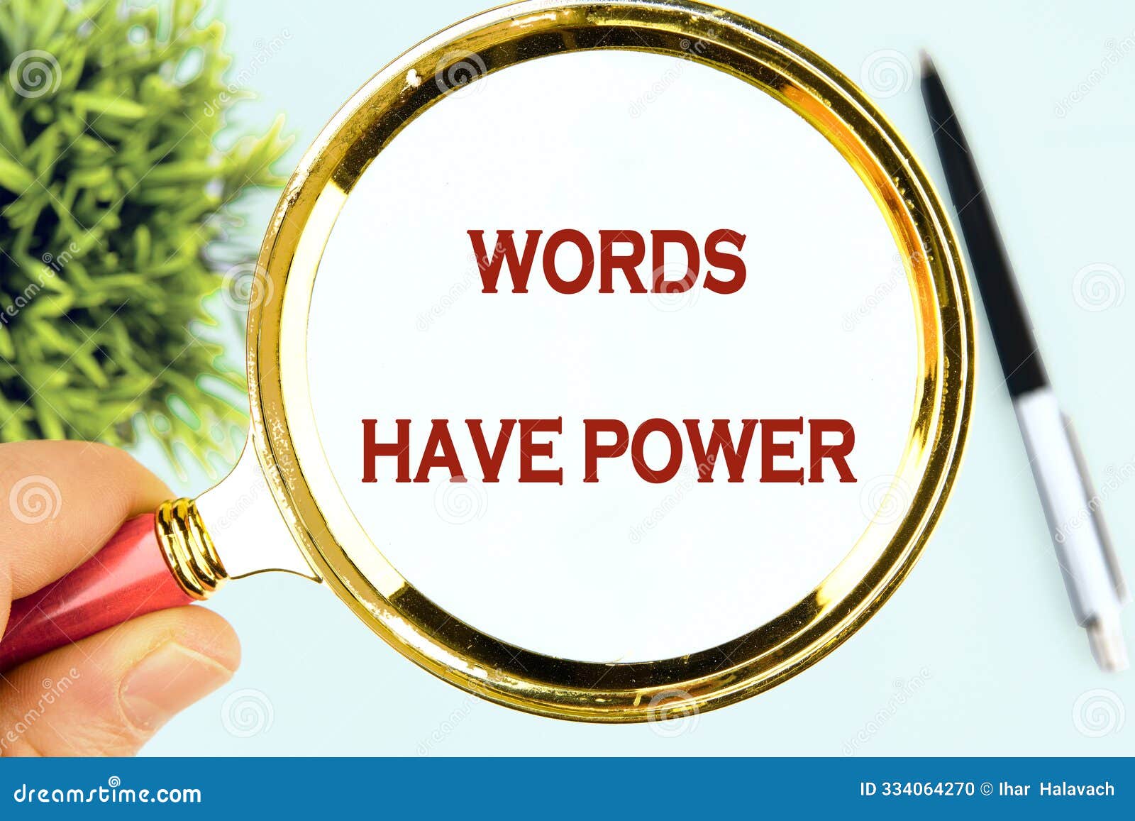 WORDS HAVE POWER TEXT Written through a Magnifying Glass, Top View on a ...