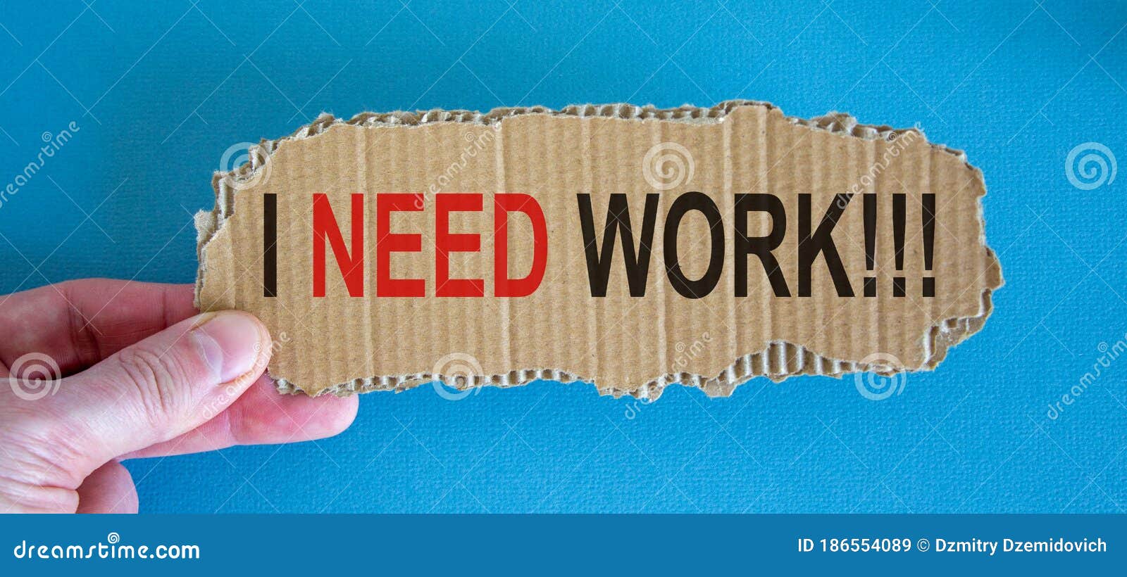Words `i Need Work` on the Piece of Cardboard between Fingers Stock ...