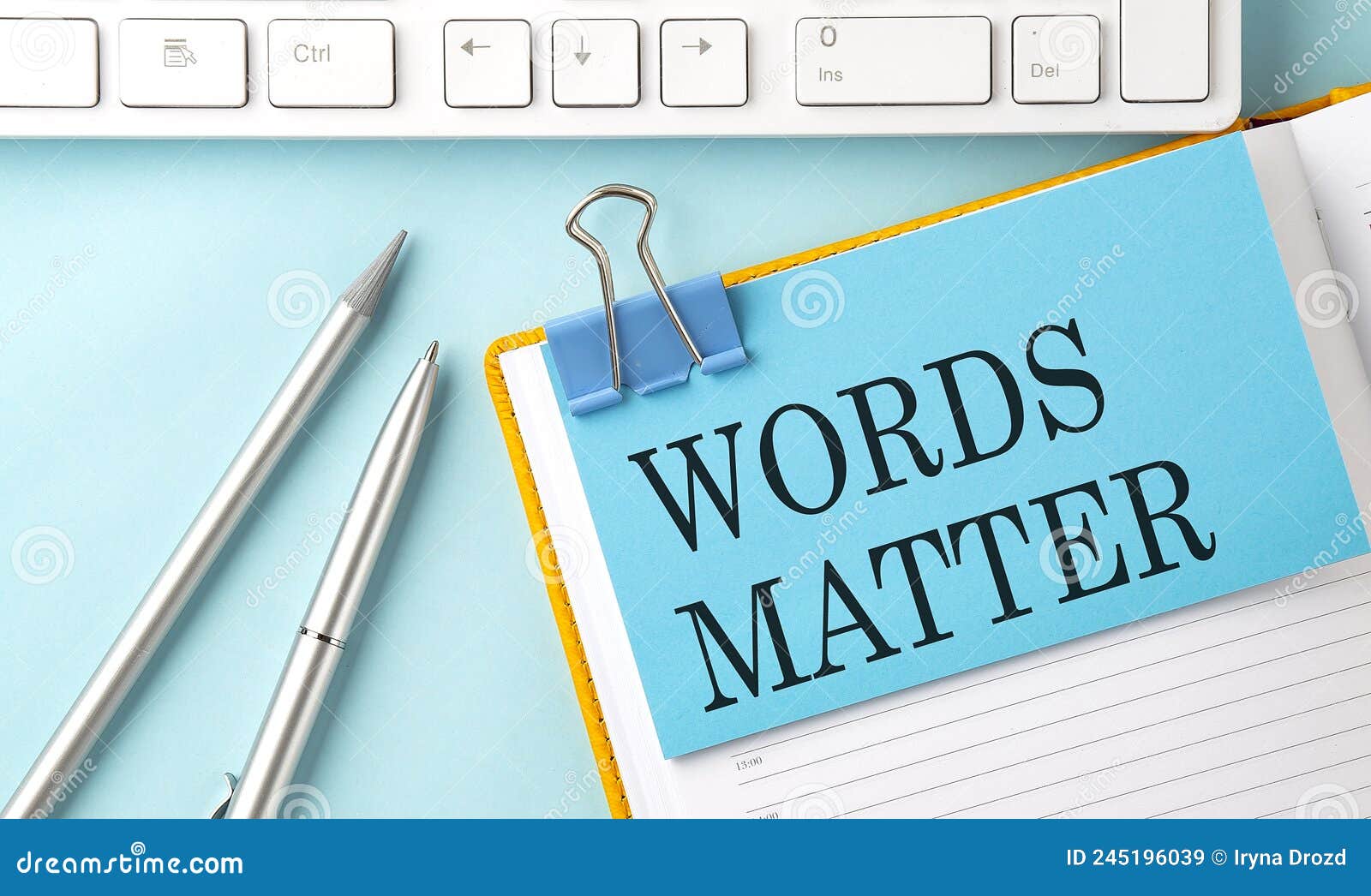 WORDS MATTER Text on Sticker on the Blue Background with Pen and ...