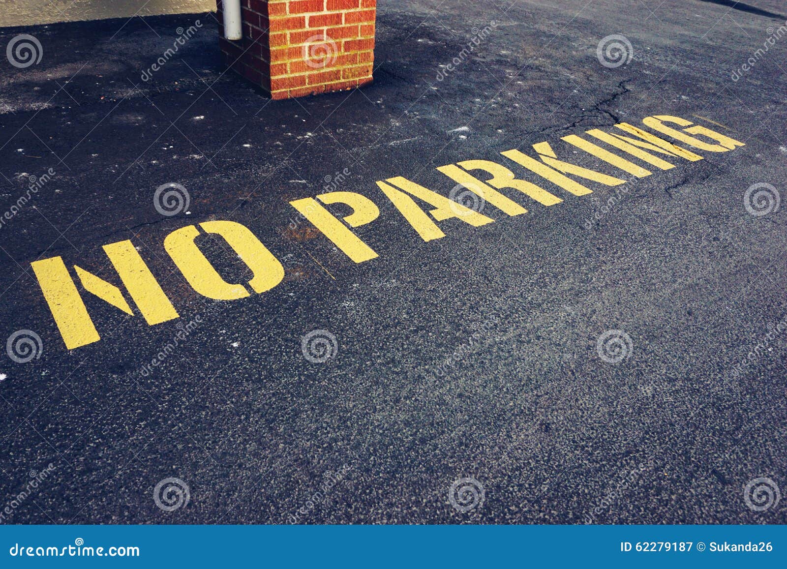The Words No Parking Painted on Pavement Stock Image - Image of letters ...