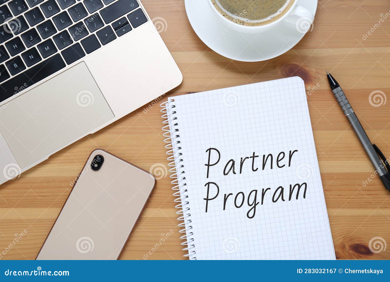 Words Partner Program in Notebook on Wooden Office Table. Workplace ...