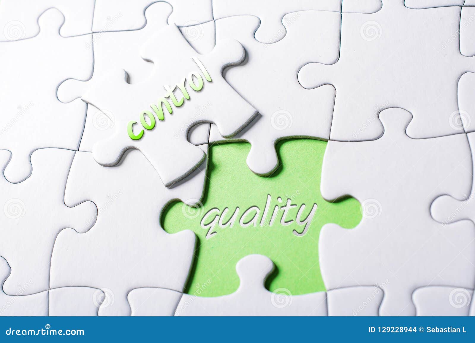 The Words Quality and Control in Missing Piece Jigsaw Puzzle Stock ...
