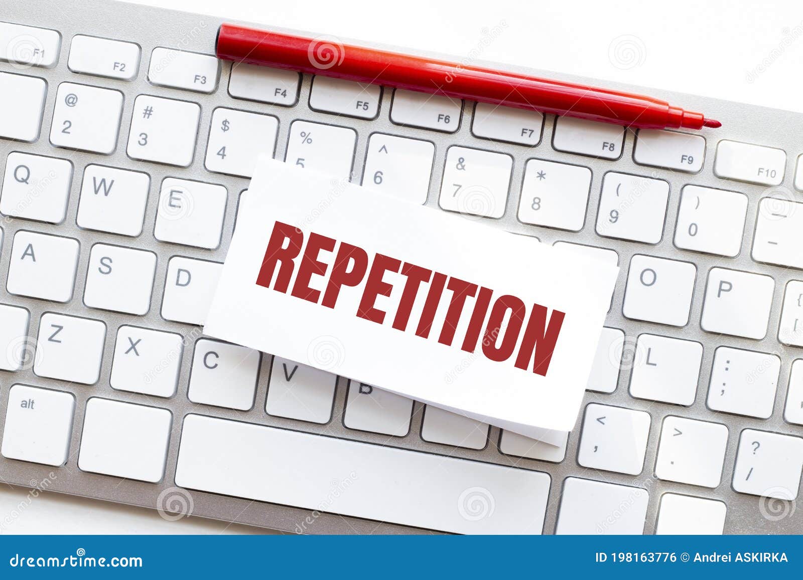 Words REPETITION Written on Torn Paper on a Computer Keyboard Stock ...