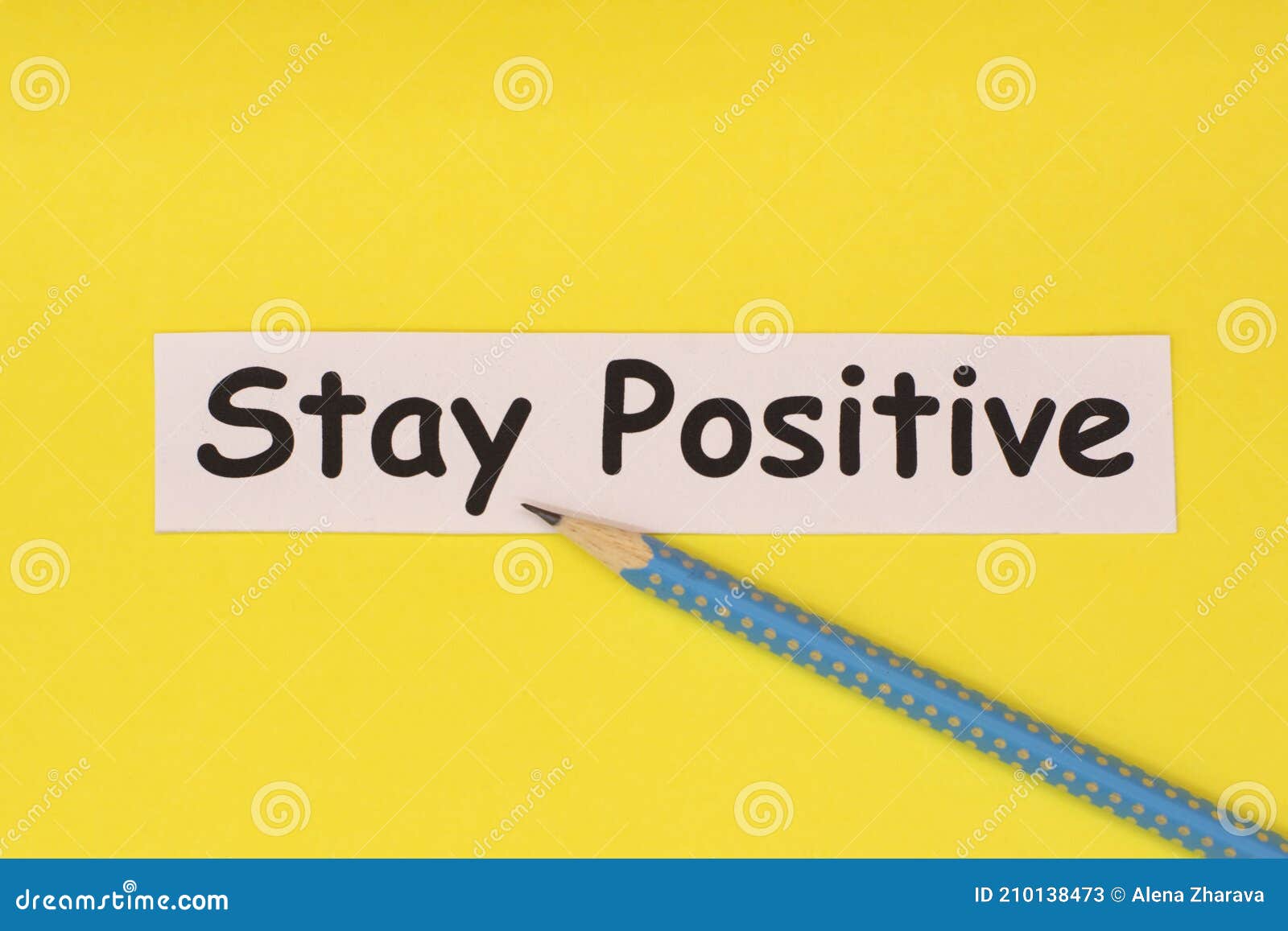 The Words Stay Positive on a Yellow Background. Motivational Concept ...