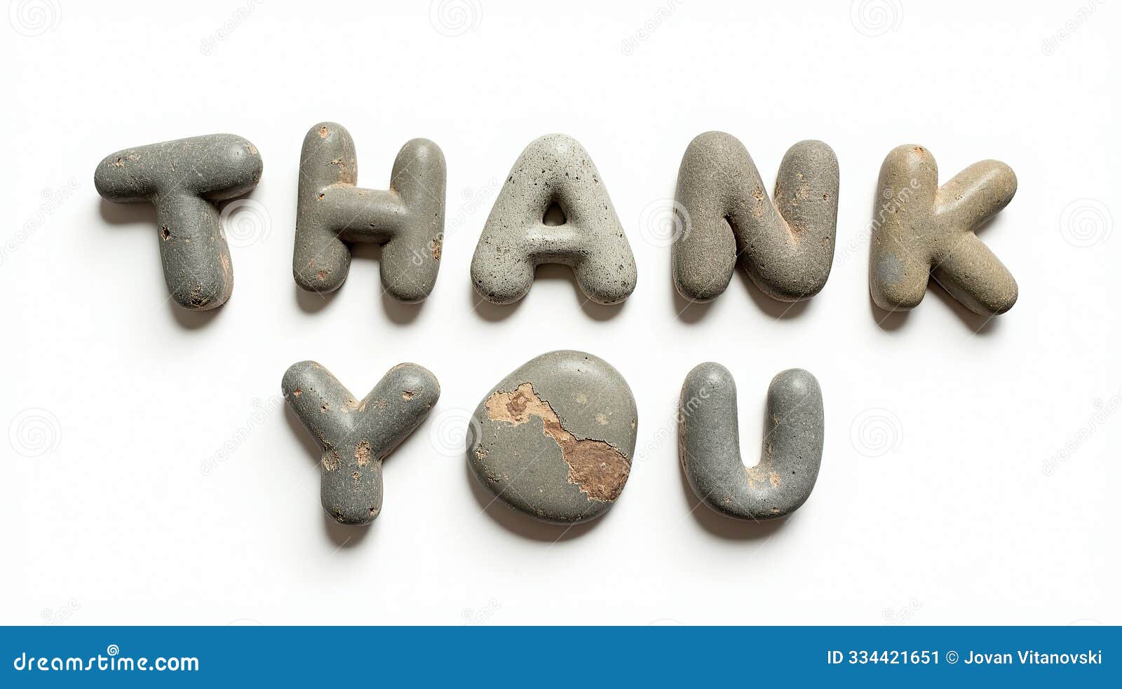 Thank You Spelled with River Stones on a White Background Stock ...