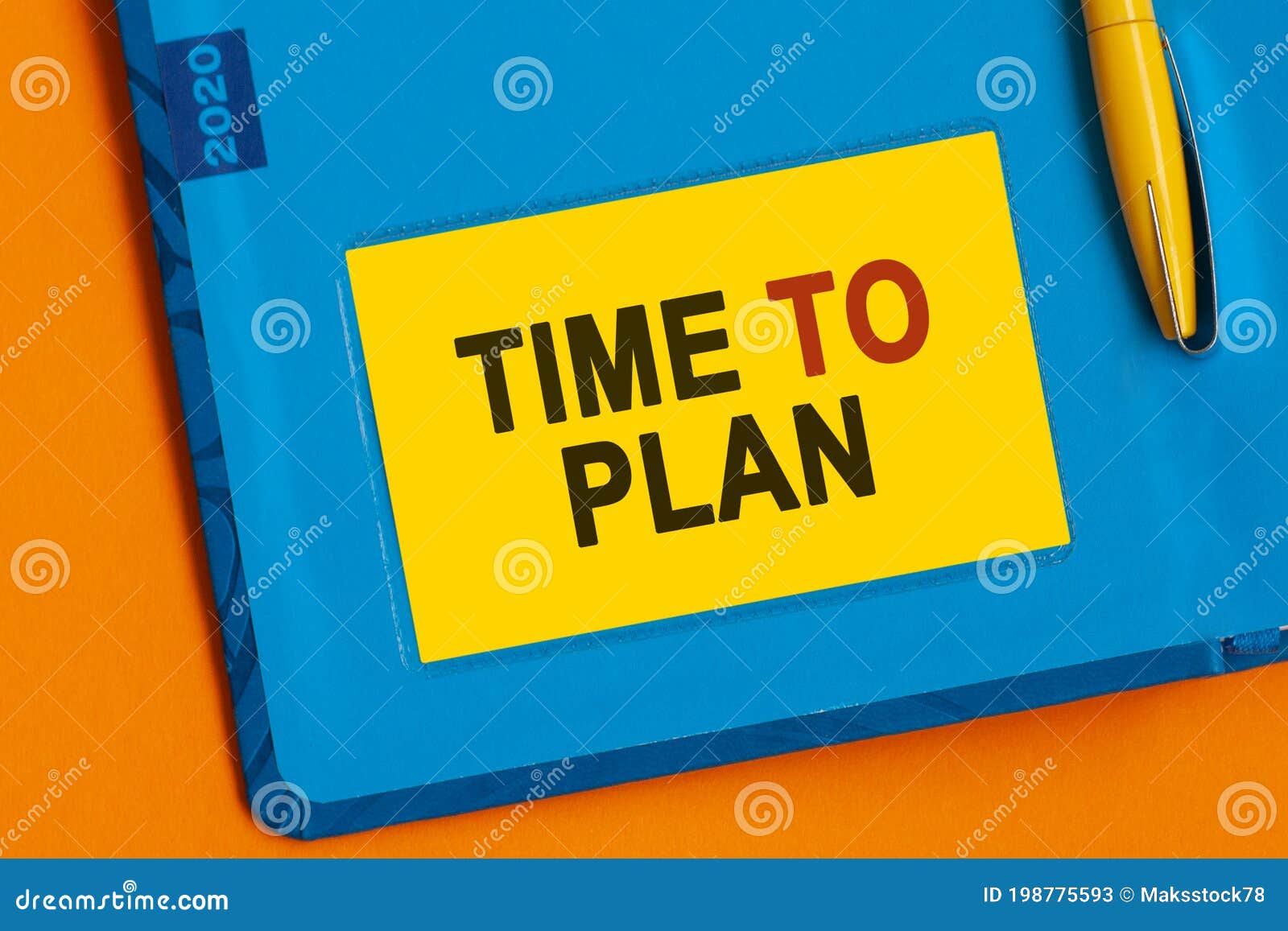 The Words TIME TO PLAN is Written in Black Letters on the Yellow Paper ...