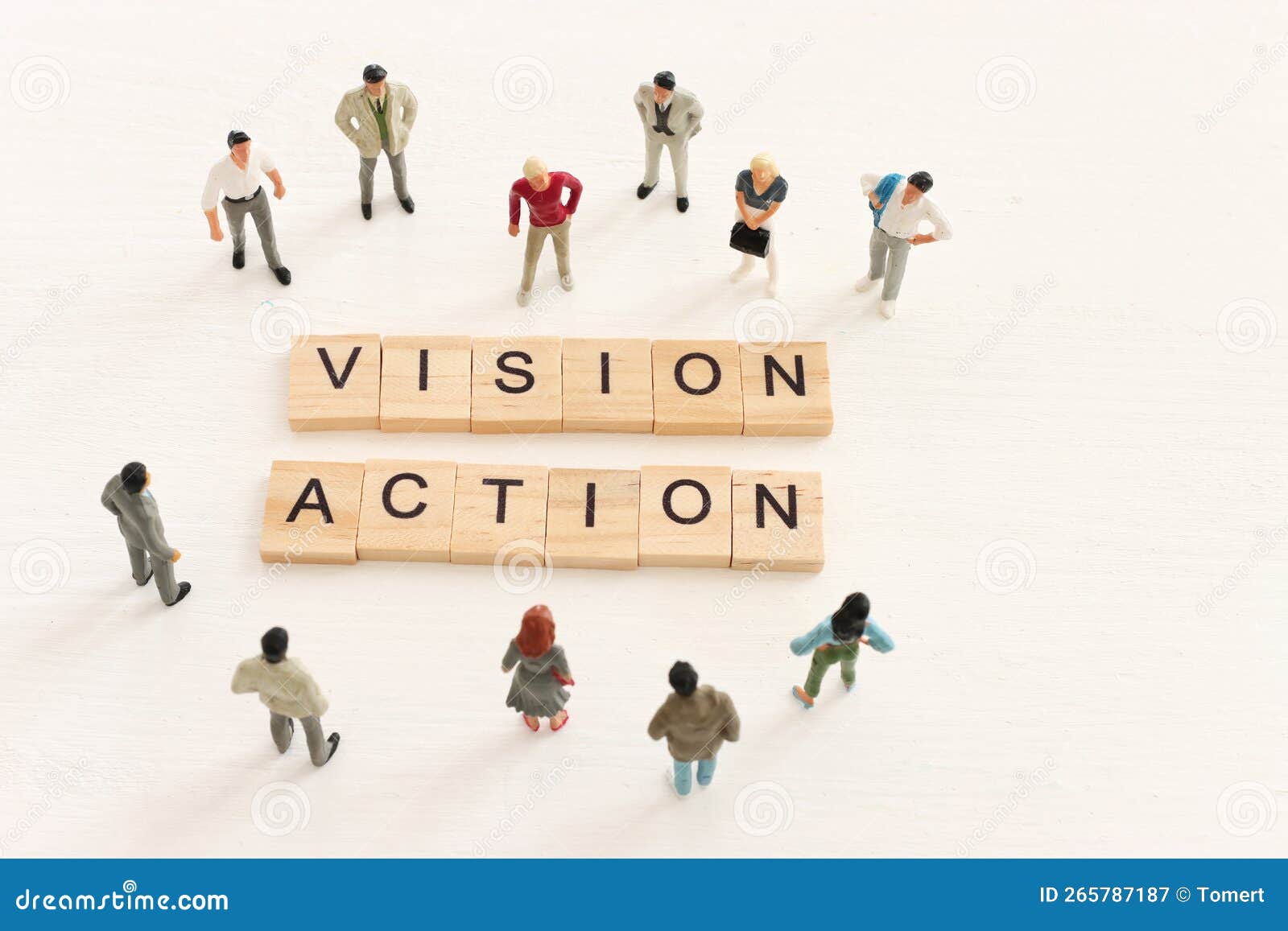 The Words Vision and Action Written on Wooden Cubes Over White ...