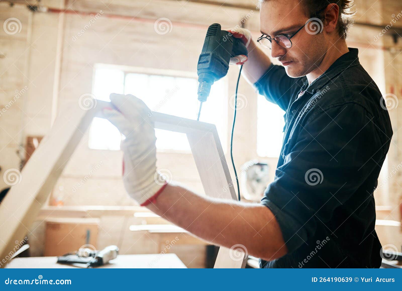 This Work of Art is almost Complete. a Handsome Young Carpenter Using ...