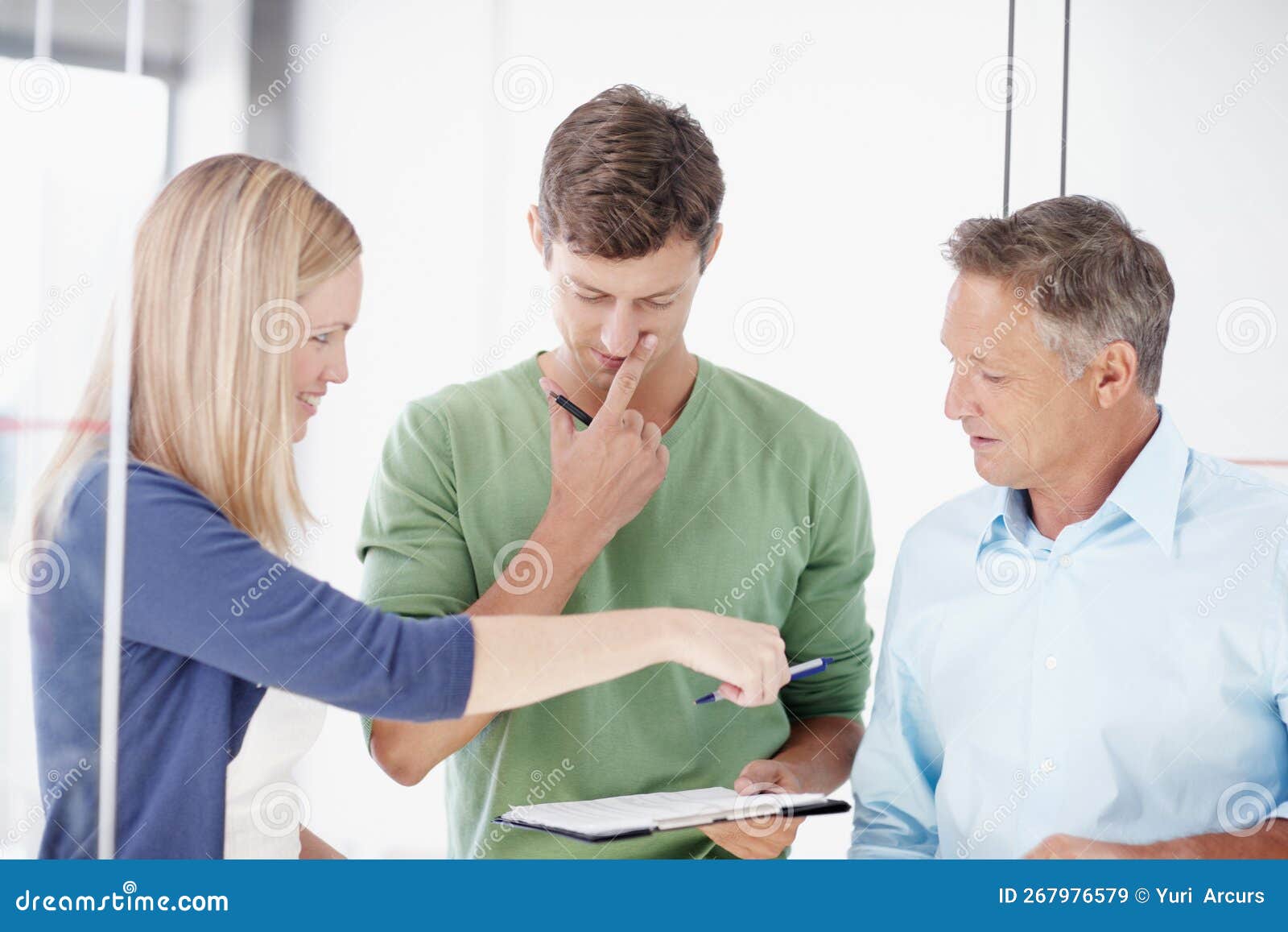 They Work Better As a Team. Three Work Colleagues Discussing Something ...