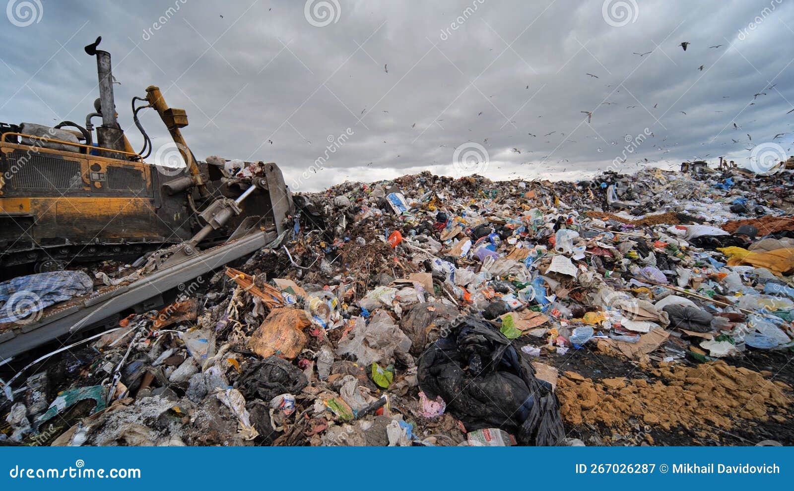 Work of a Bulldozer at a Landfill. Stock Image - Image of piled ...