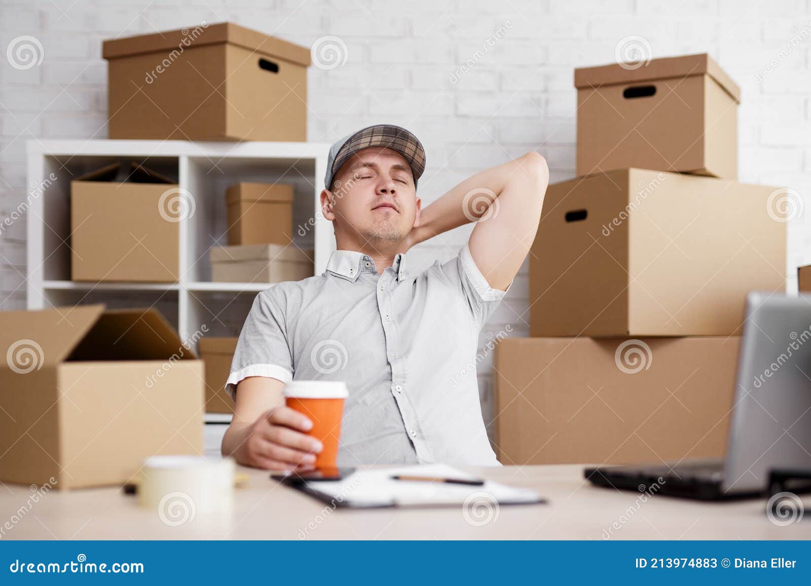 Work and Business Concept - Tired Postman Resting in Workplace and ...