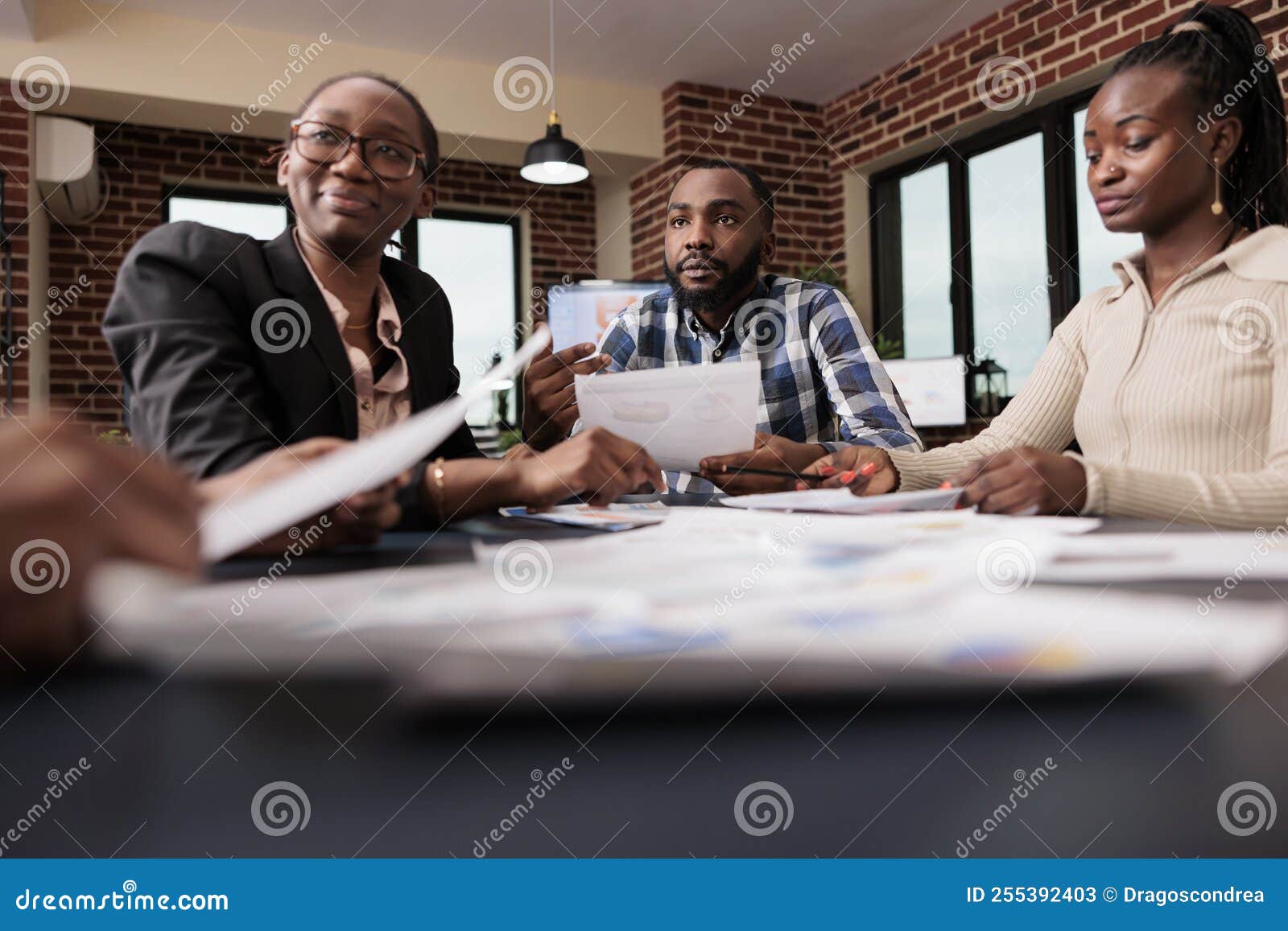 Work Colleagues Brainstorming Ideas To Create Report Stock Image ...