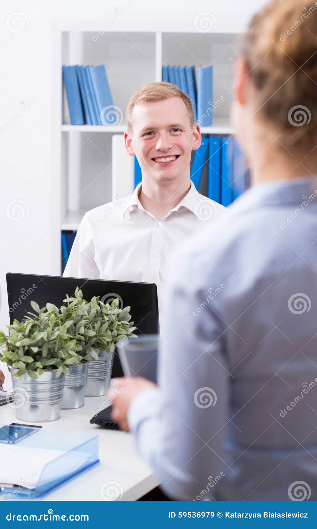 Work colleagues discussion stock image. Image of conversation - 59536979