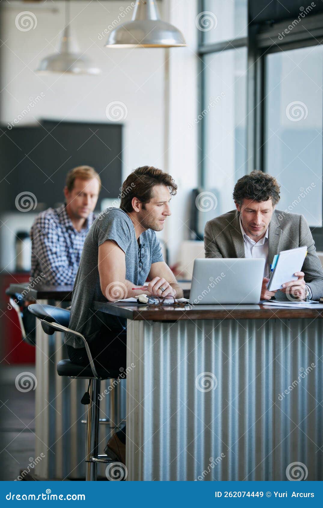 Work always Comes First. Three Businessman Discussing Work in the ...