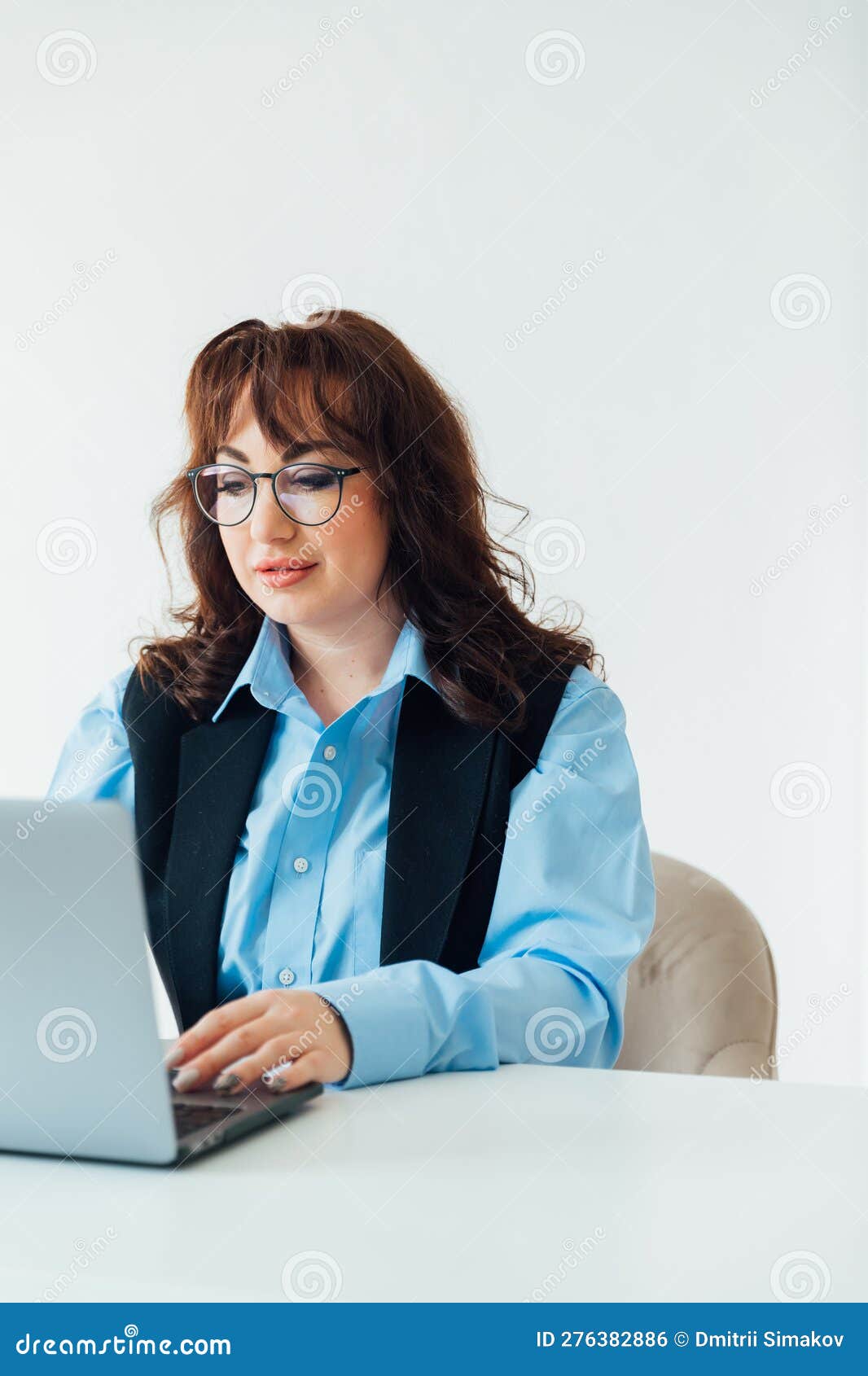Work at the Computer a Woman Communicates Online Remotely Stock Photo ...
