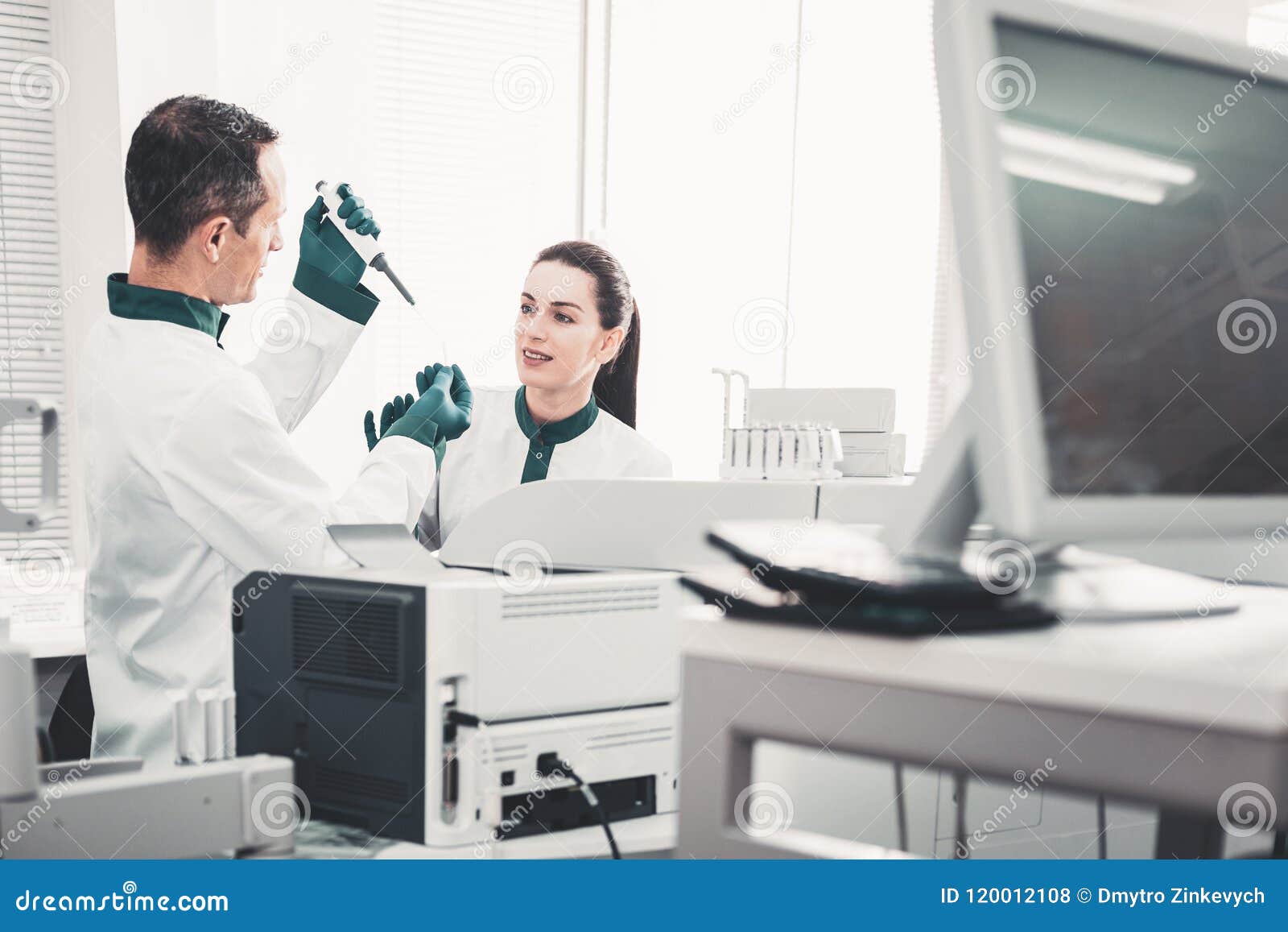 Concentrated Laboratory Workers Checking Analyses Stock Photo - Image ...