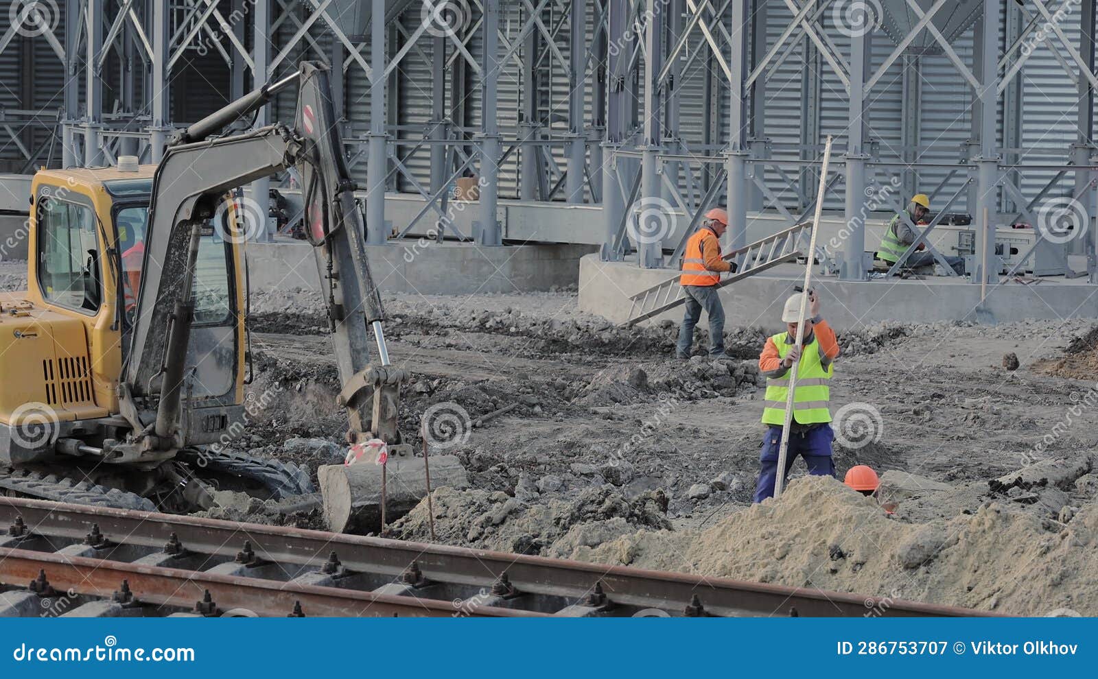 Work on the Construction of a Railway Track. Construction Workers are ...