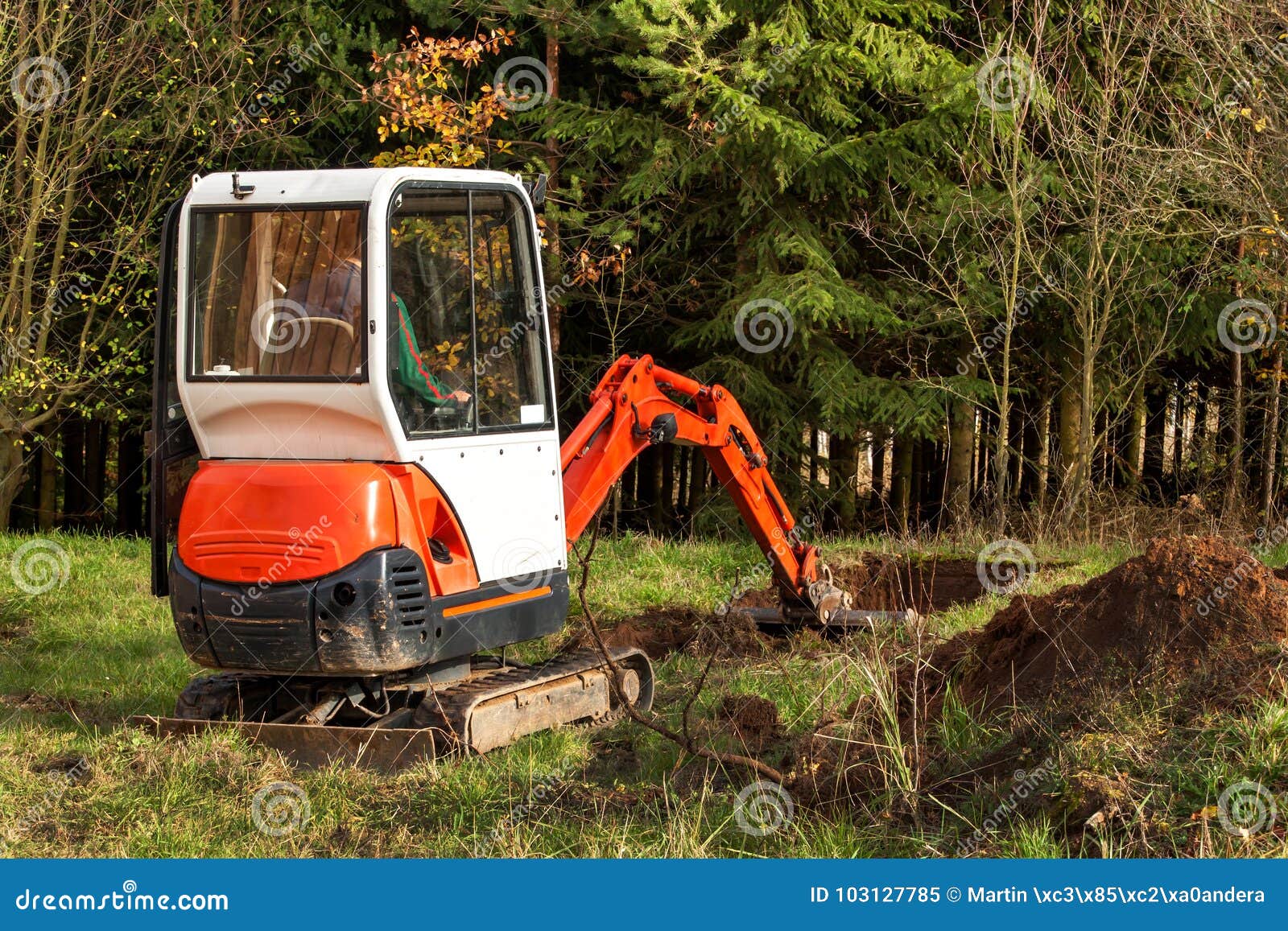 Work on the Construction Site of an Ecological House. the Excavator ...