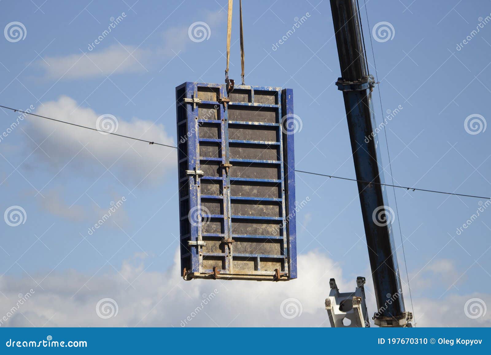 Work at a Construction Site. Moving a Wall with a Crane Stock Photo ...