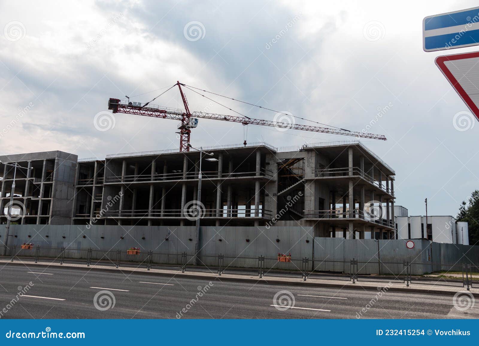 Work of a Construction Tower Crane on a Background of Blue Sky. Stock ...