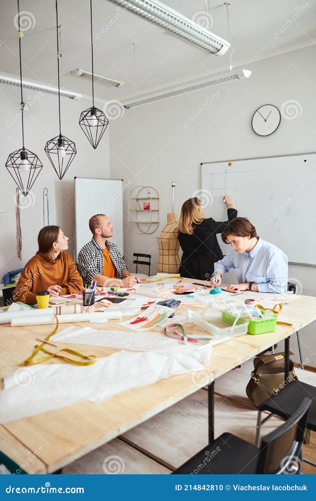 Work in the Dressmaking Establishment with Several Designers Together ...