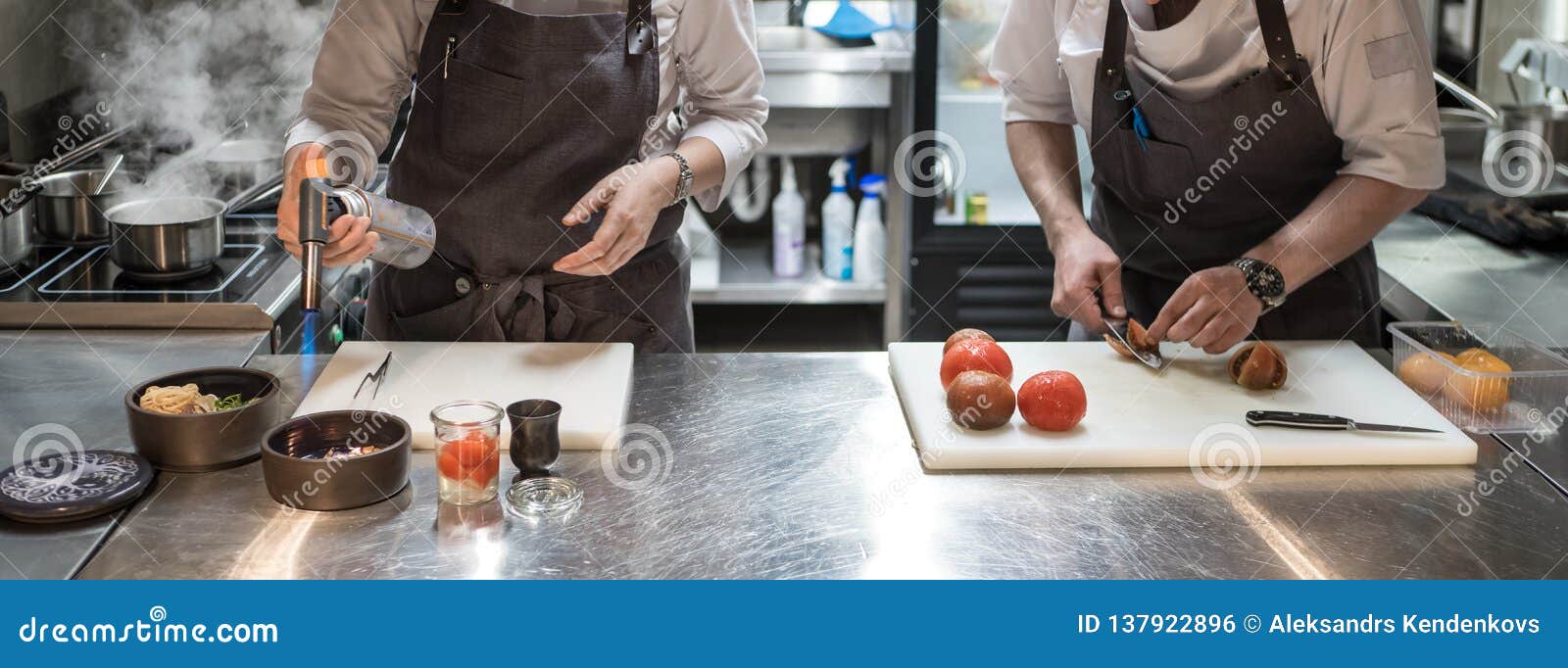 Two Cooks for Cooking. Work with a Flame, Work with a Knife. Stock ...