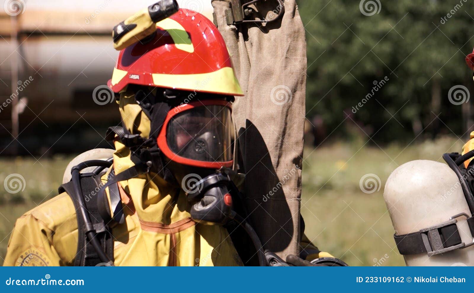 Work in a gas mask. Clip stock photo. Image of grass - 233109162