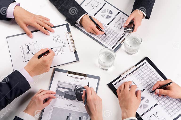 Work in group stock image. Image of meeting, holding, briefing - 9344953
