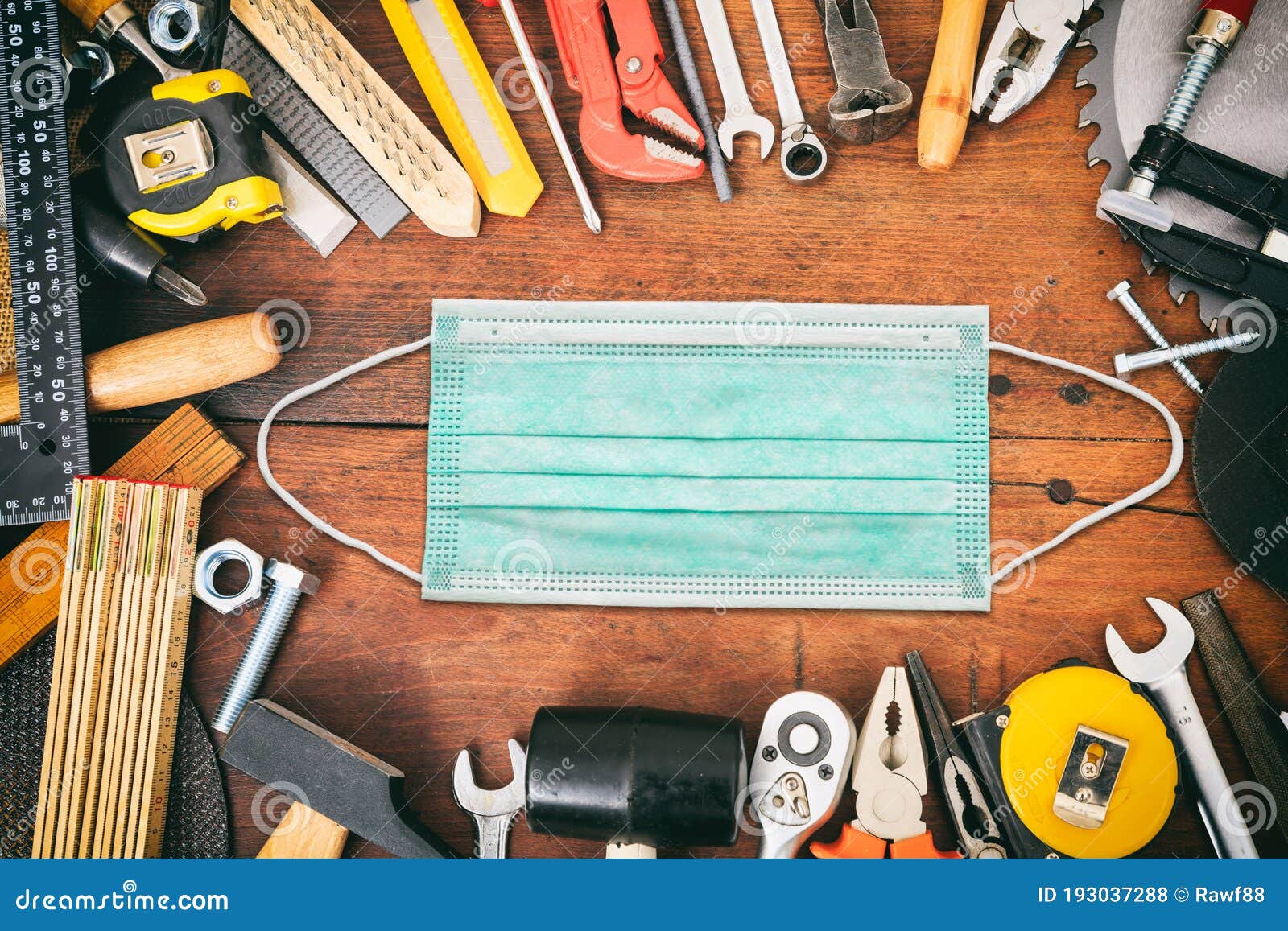 Worker Hand Tools and Protective Mask on Wooden Background Stock Photo ...
