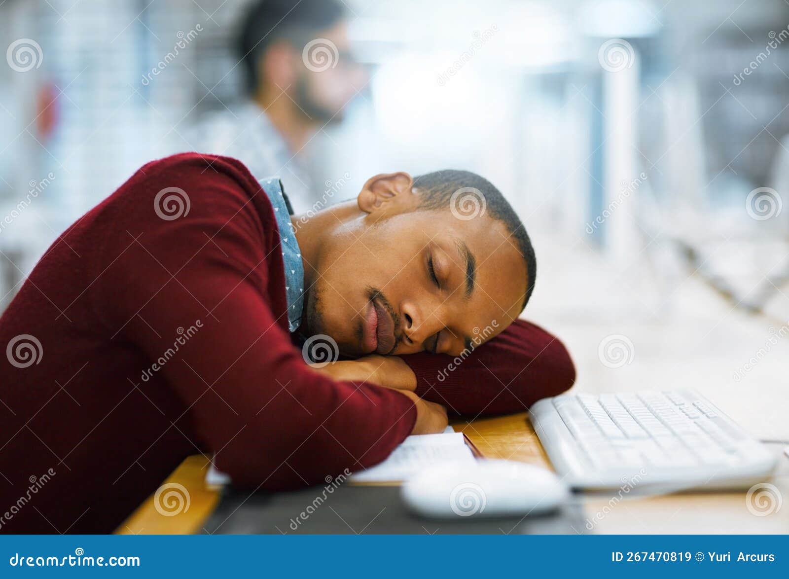 This Work Has Got Me Tired. a Tired Young Man Sleeping on a Desk with ...