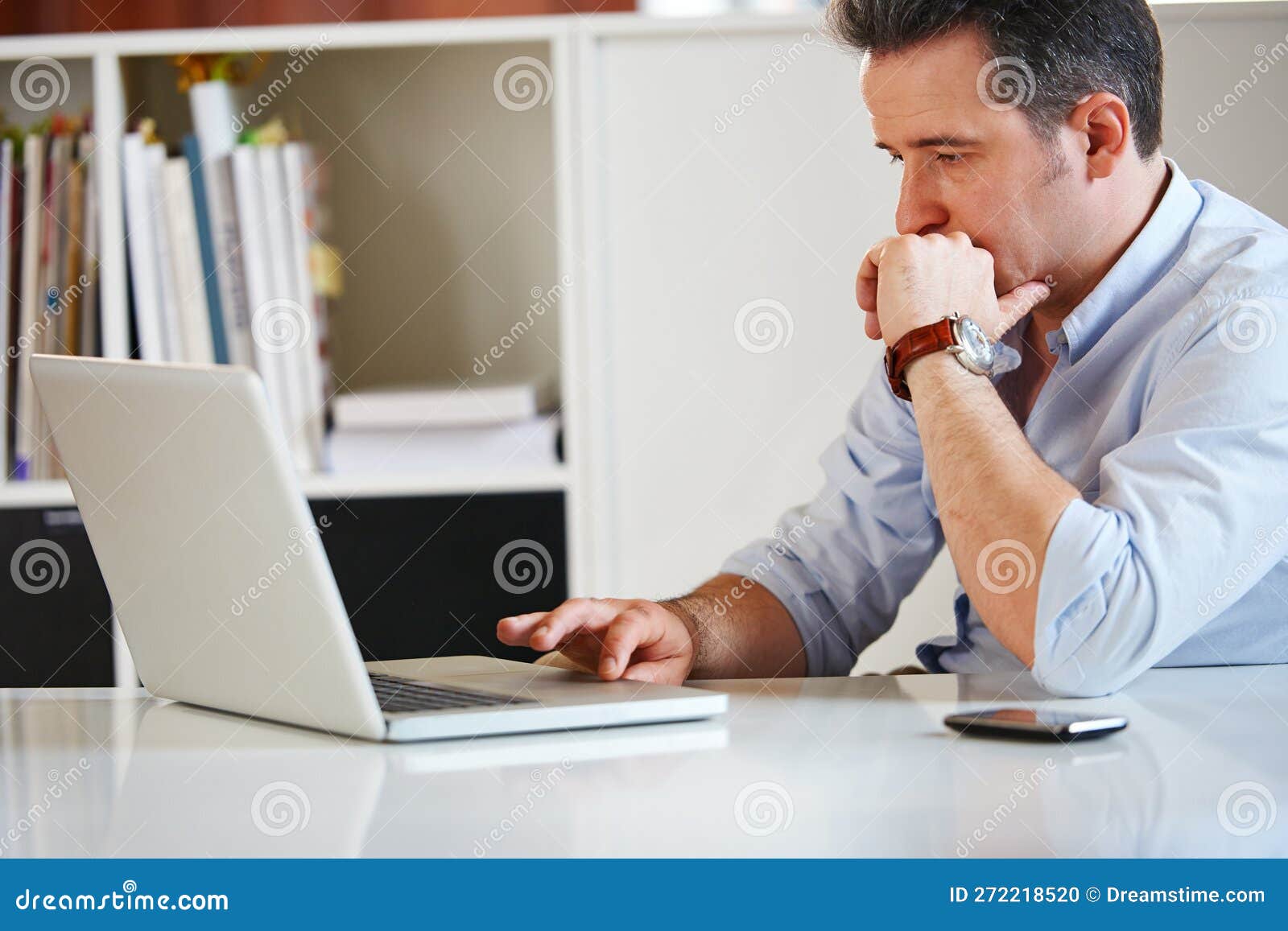 Work Has Him Stressed. a Stressed Out Businessman Using a Laptop. Stock ...