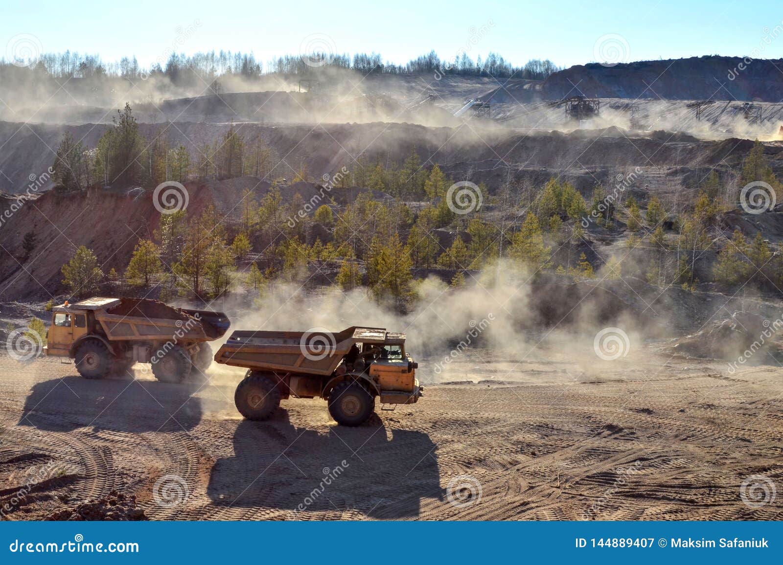 The Work of Heavy Machinery and Mining Trucks for the Transport of Bulk ...