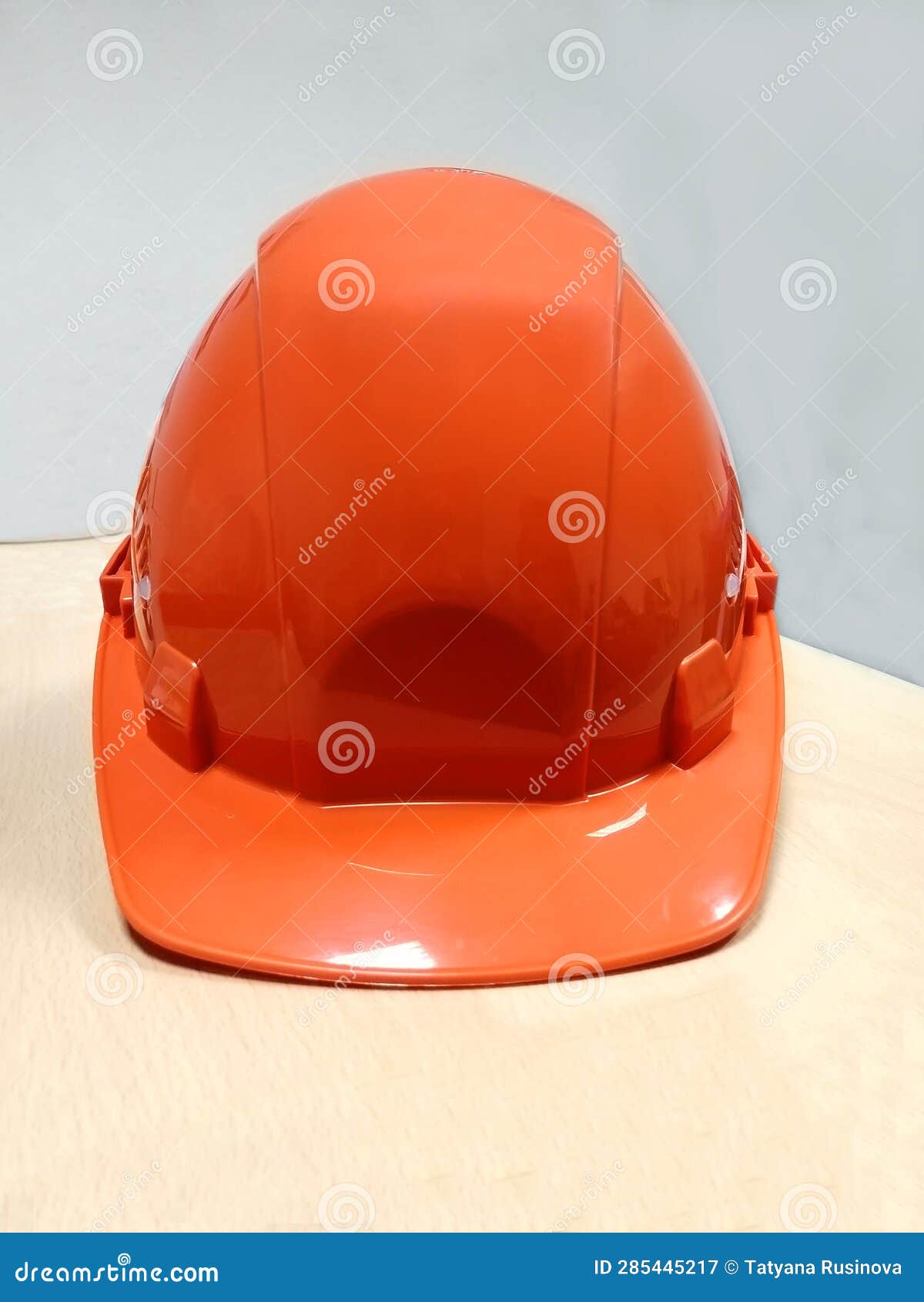 Work Helmet Orange on the Table, Safety Helmet. Editorial Photography ...
