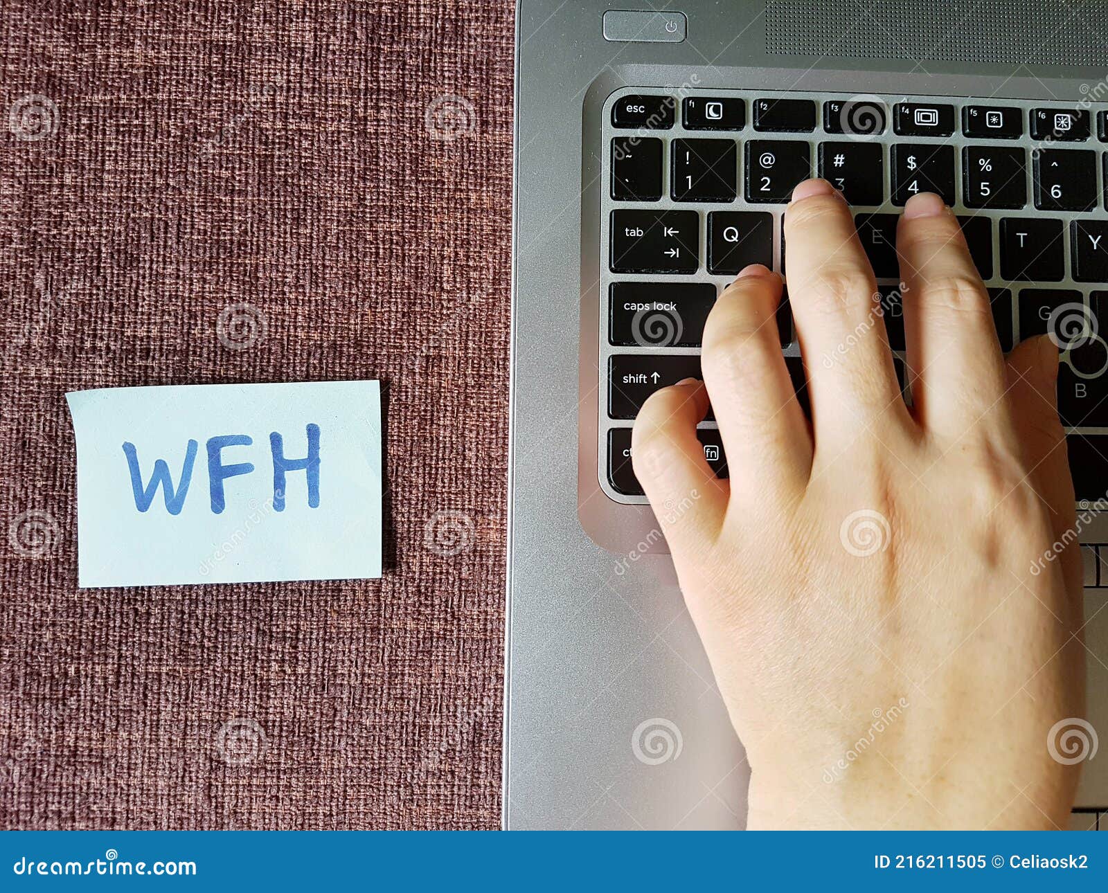 Work from Home Concept. a Sticky Note Wit the Word `WFH` Placed beside ...