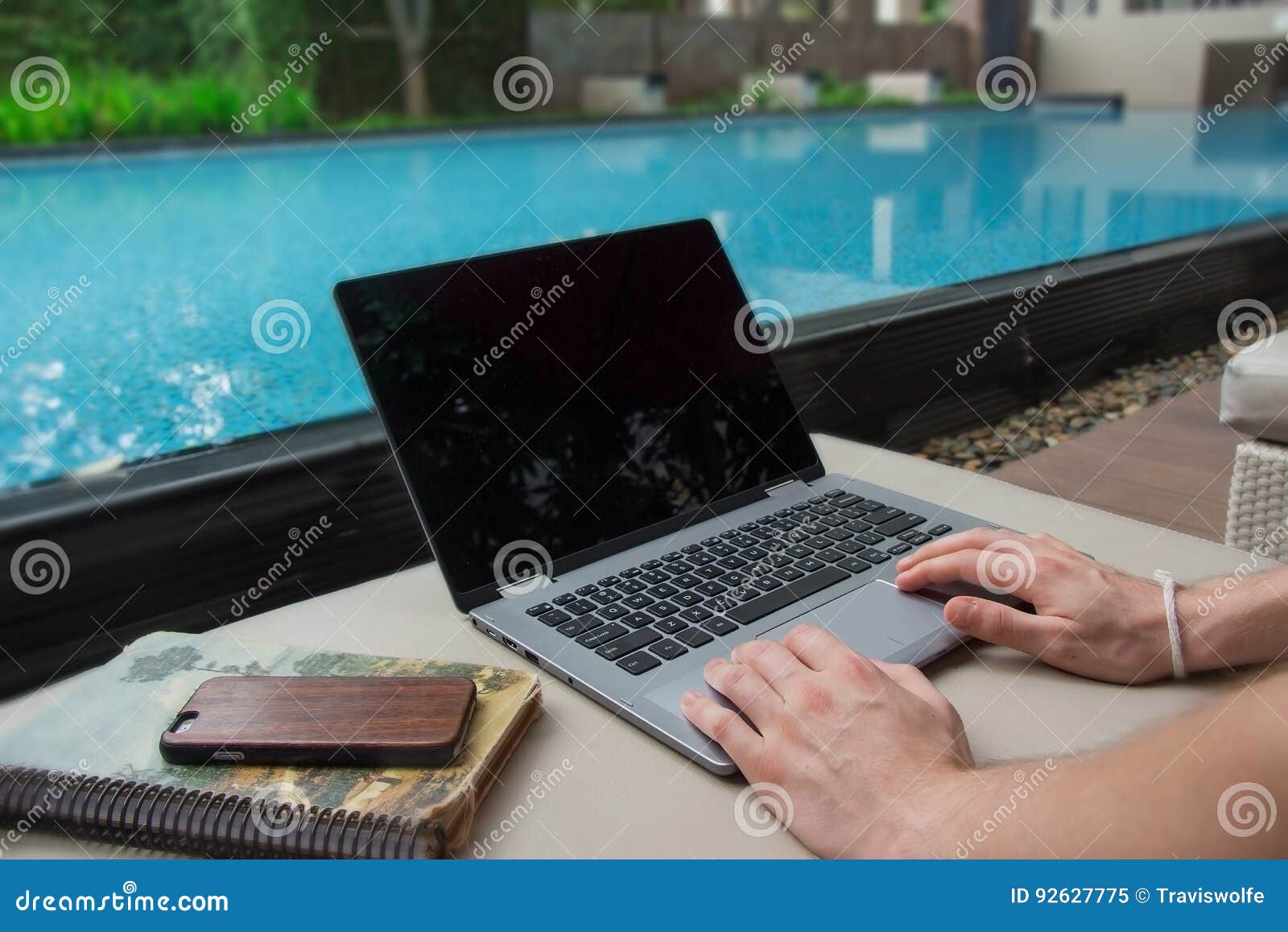 Work from home by the pool stock image. Image of outside - 92627775
