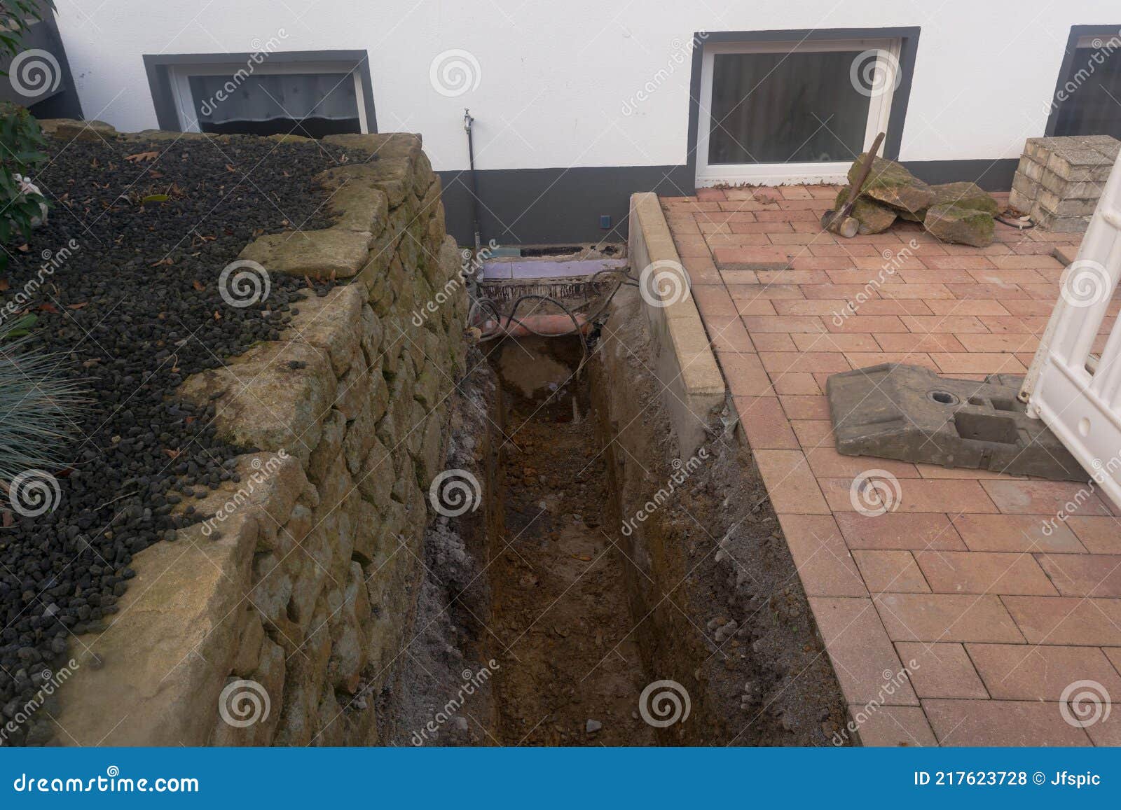 Two Plastic Pipes in a Sand Ditch Stock Photo - Image of connect ...