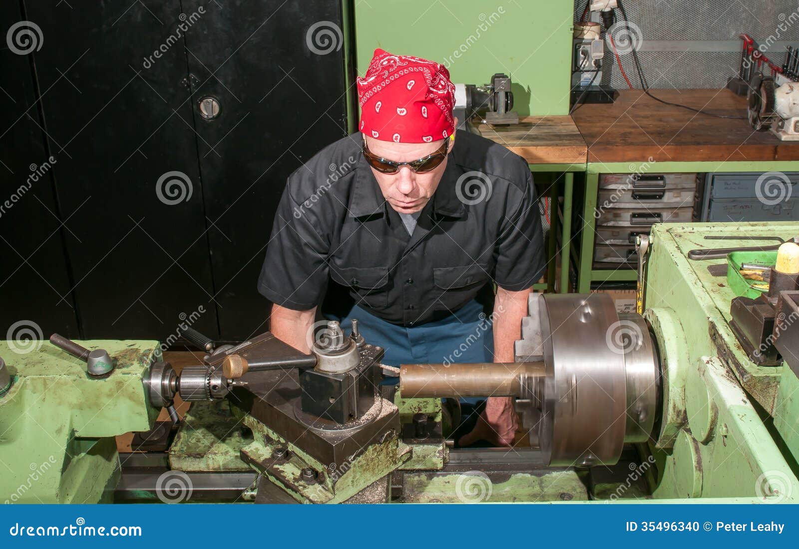 At work on a lathe. stock photo. Image of mechanical - 35496340