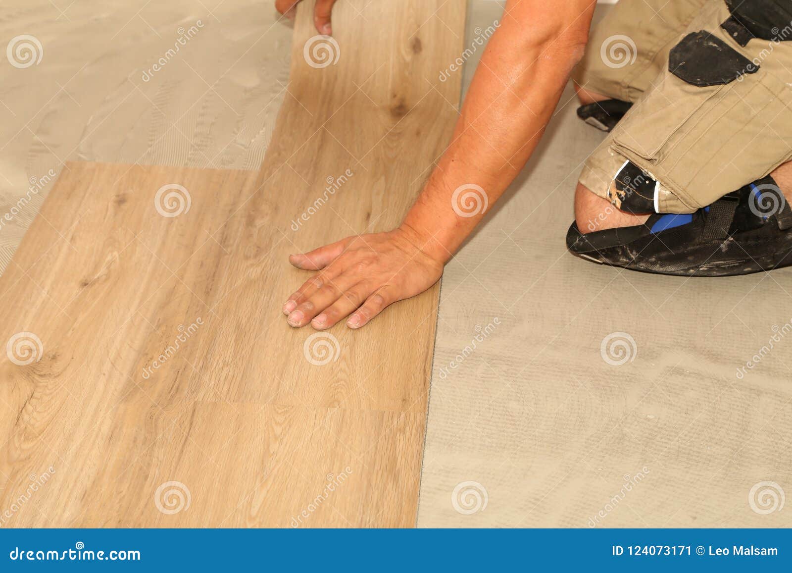 Work on laying flooring stock image. Image of industry - 124073171